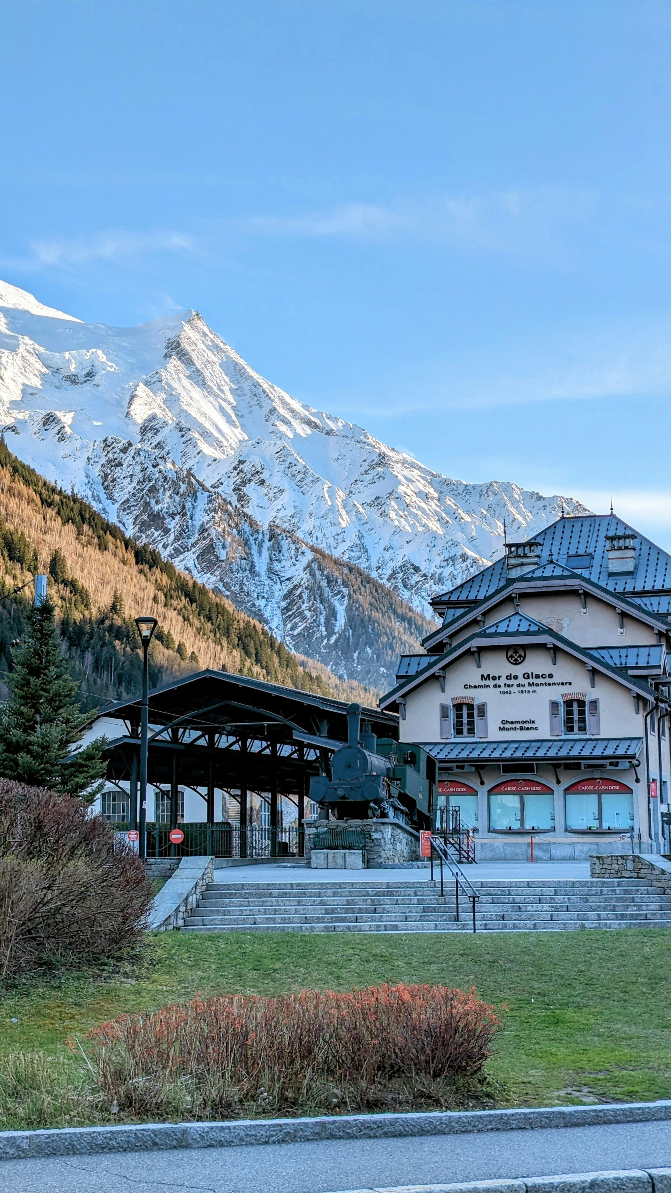 Alpine Lodge at the Foot of Snow-Spired Peaks