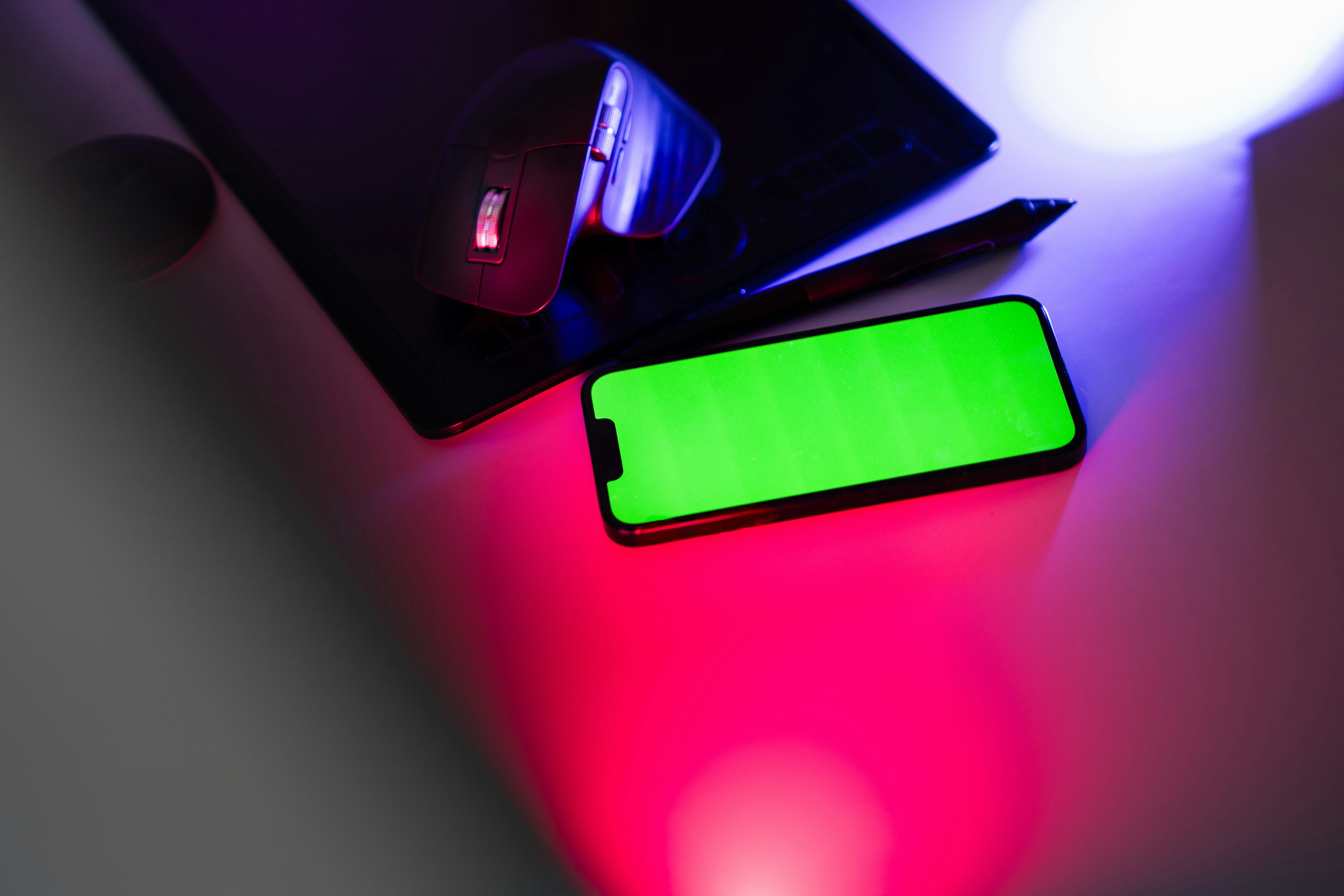 A computer mouse and a battery on a desk photo – Free Business Image on ...