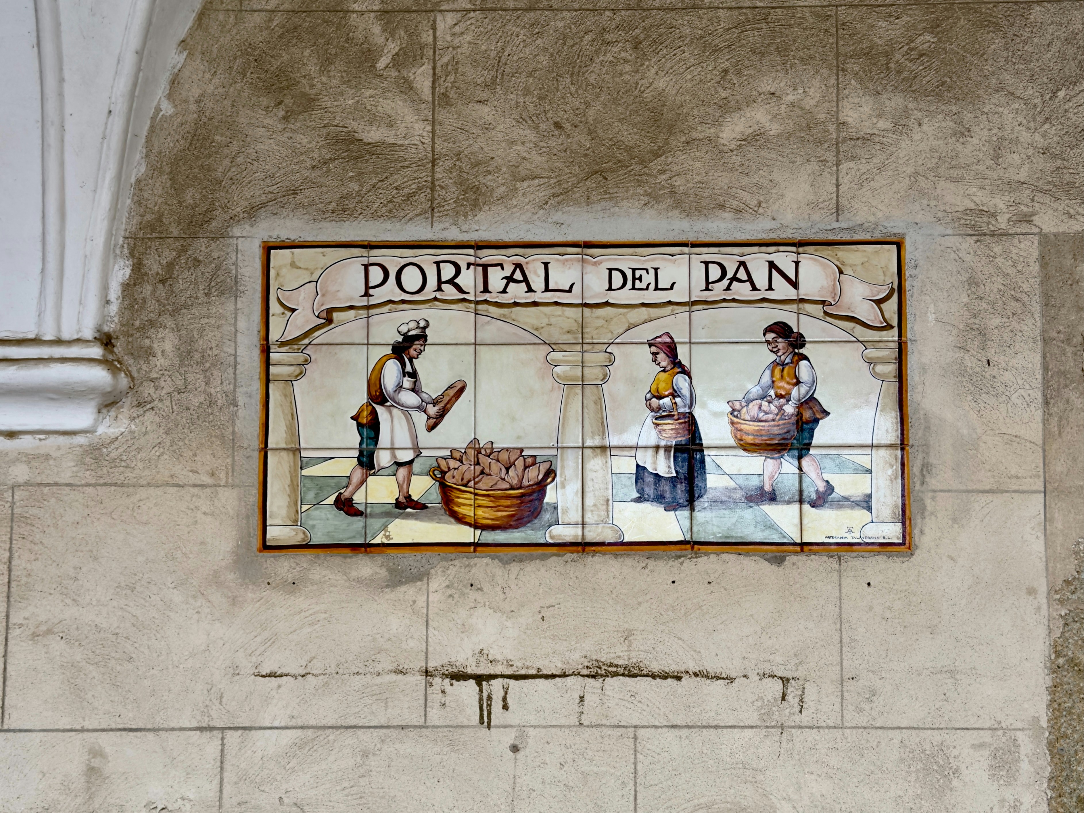 Historic Tile Sign on Weathered Wall