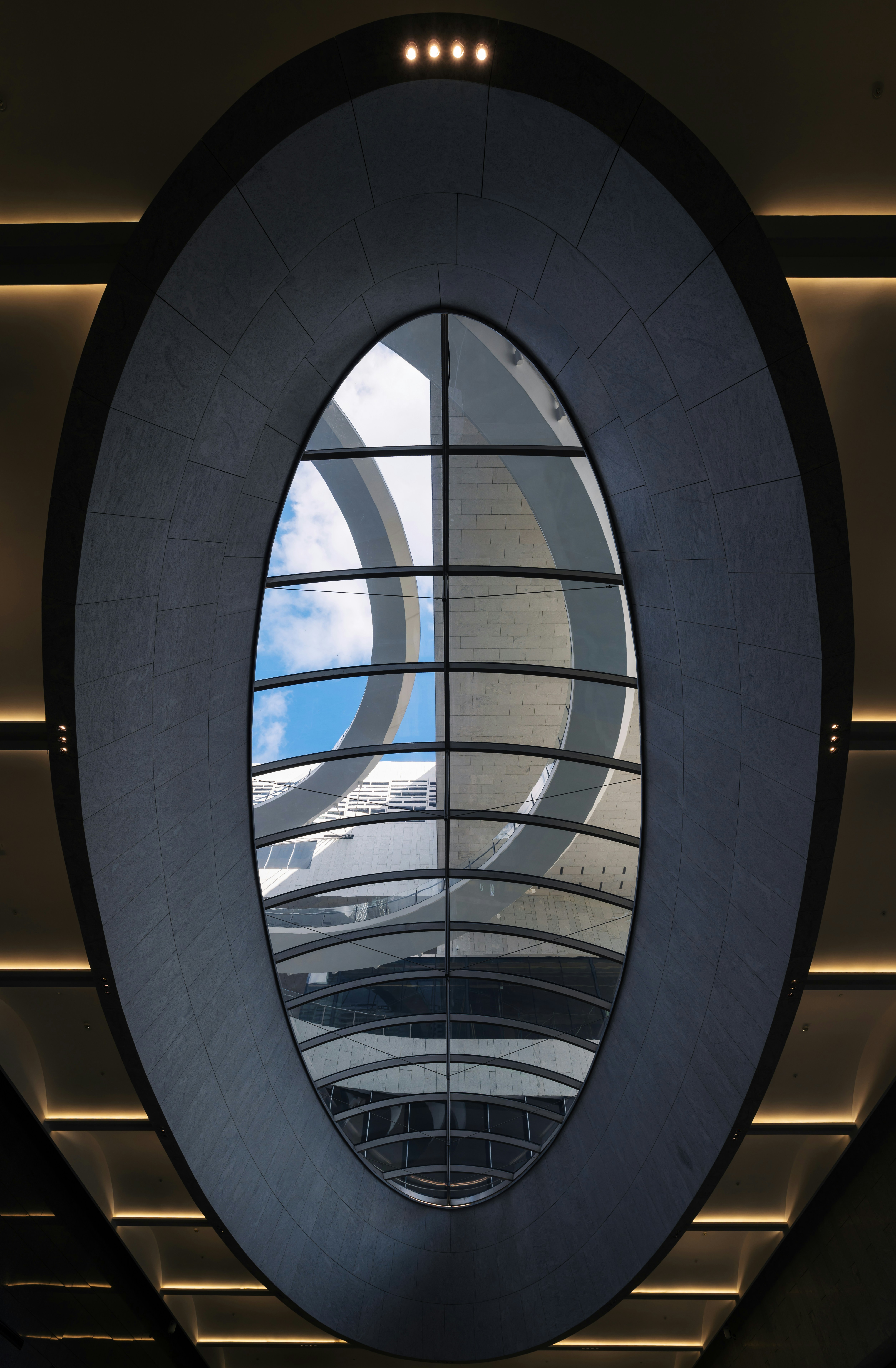A circular window in a building with a sky background photo – Free ...
