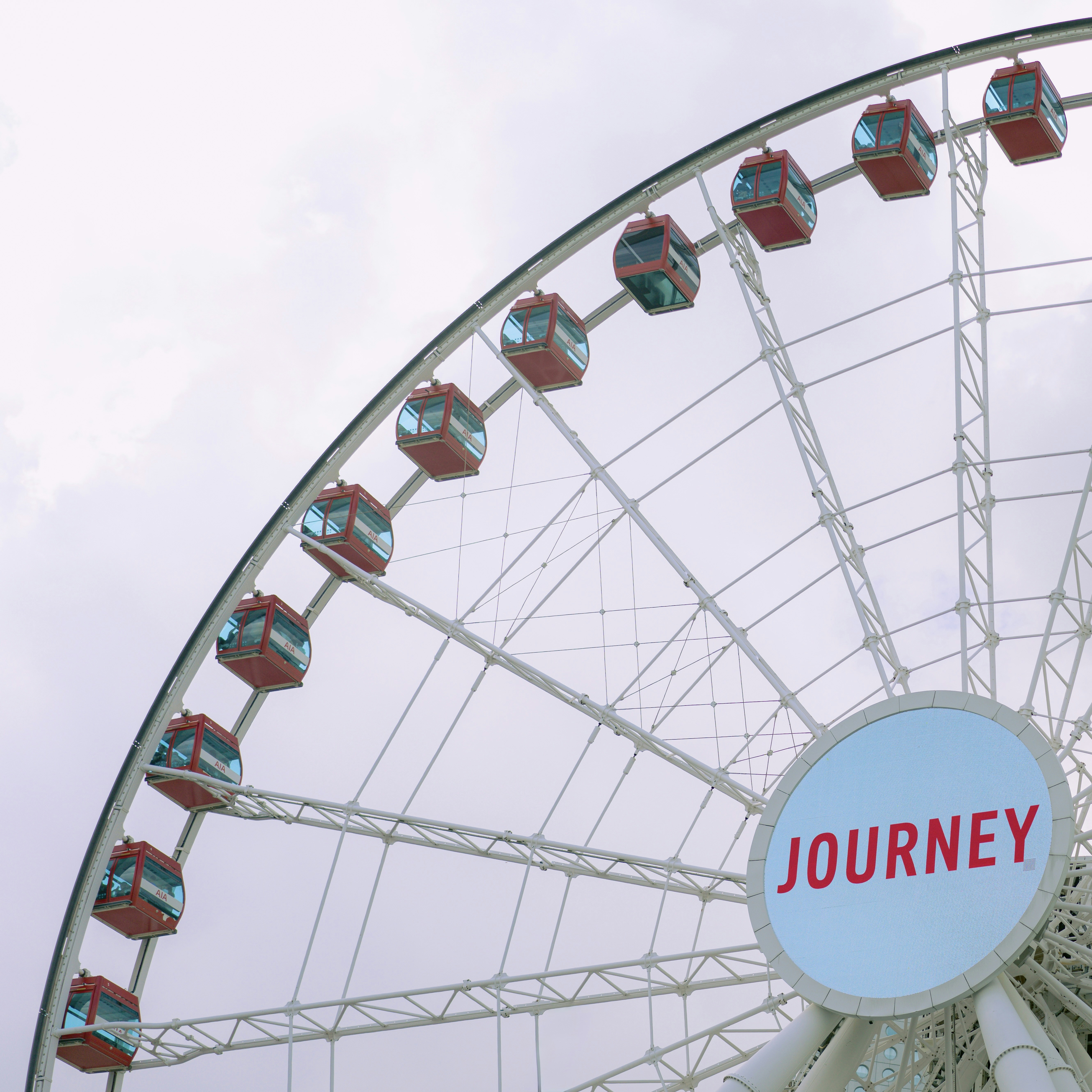 A large ferris wheel with a sign that says journey photo – Free Hong ...