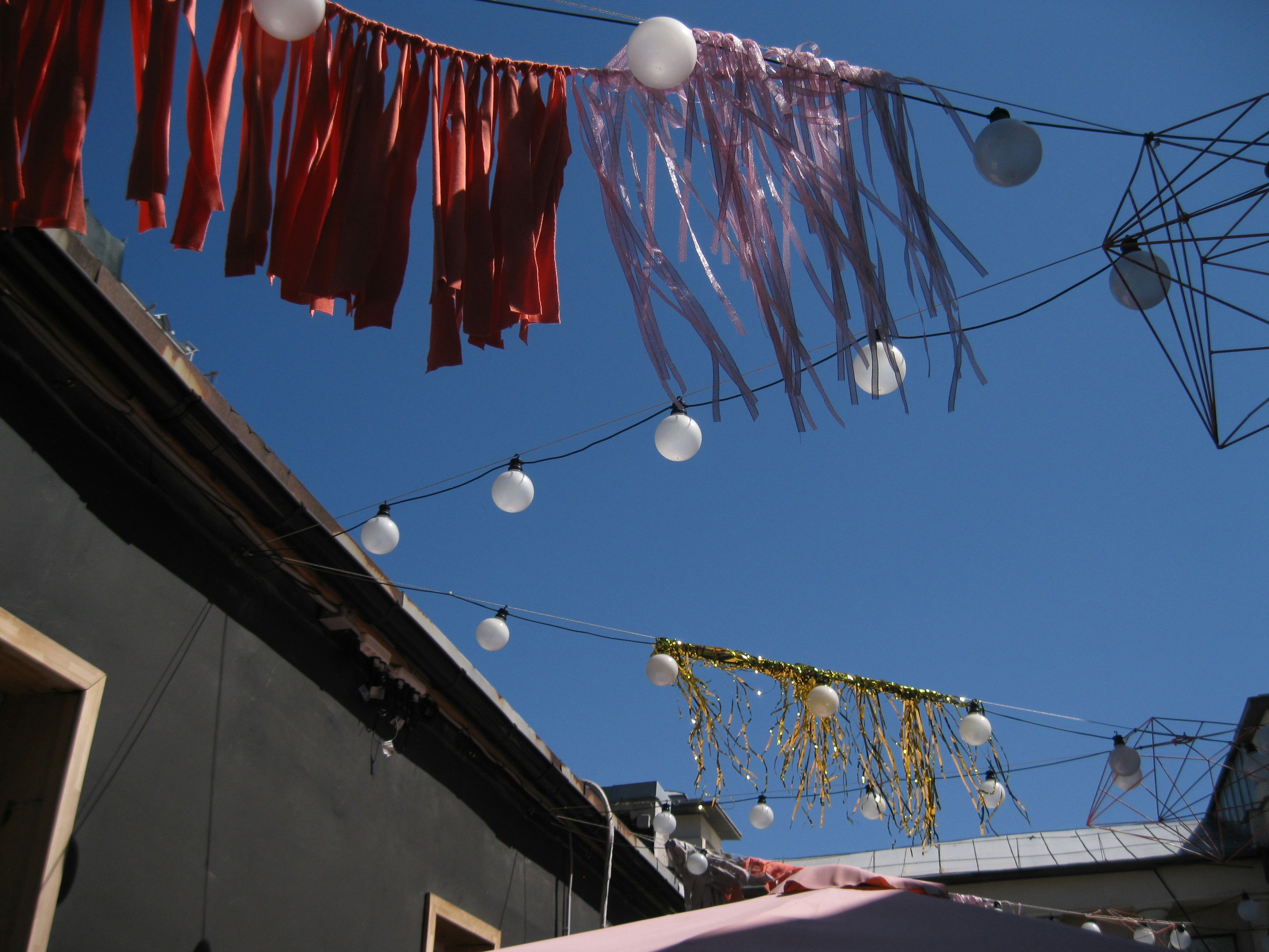Festive Threads Weaving Across a Clear Sky