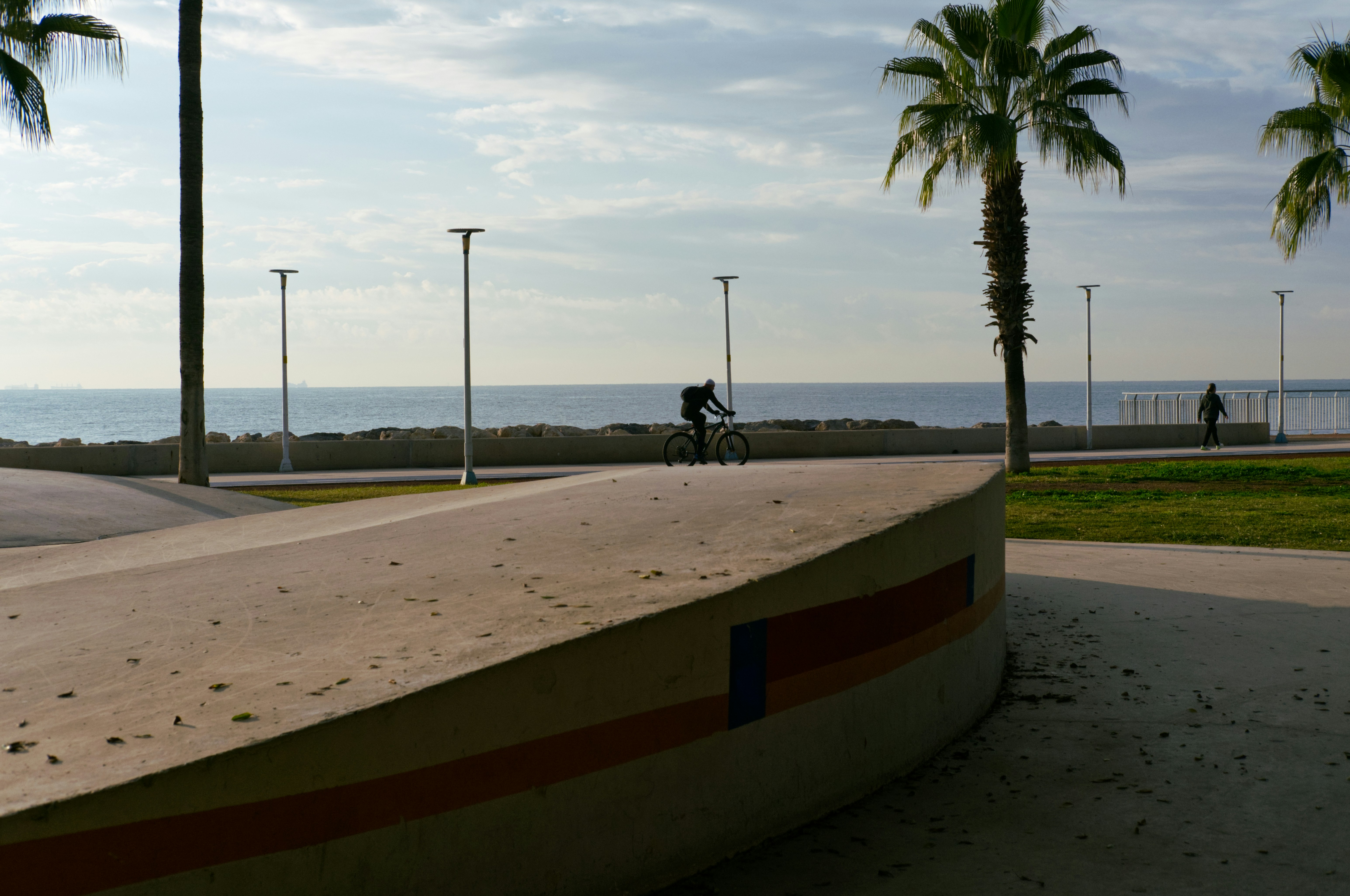 A skateboarder is doing a trick on a ramp photo – Free Mersin Image on ...