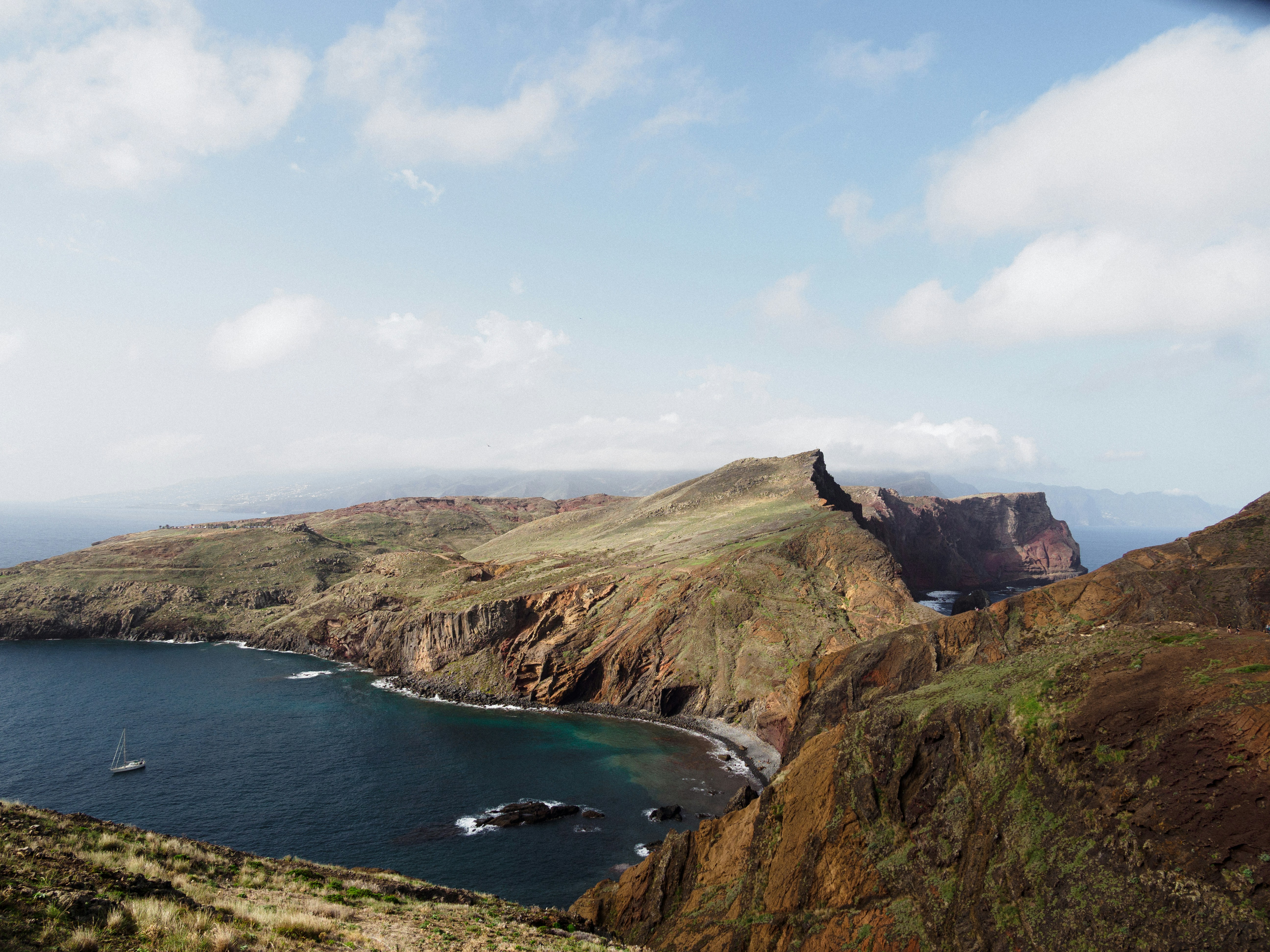 A view of a body of water from a hill photo – Free Ponta de são ...