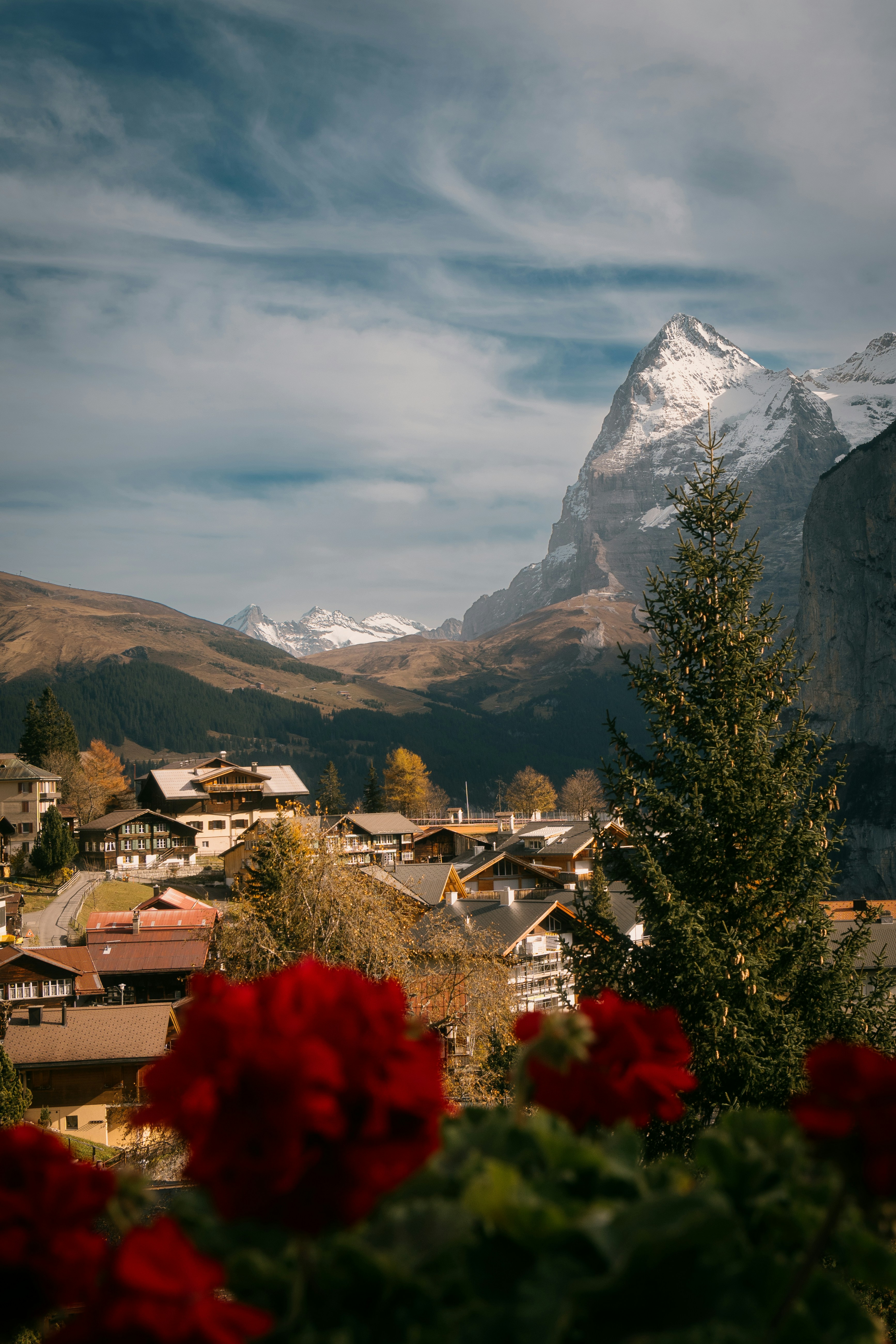 Snow-Kissed Peak Over a Quiet Alpine Village