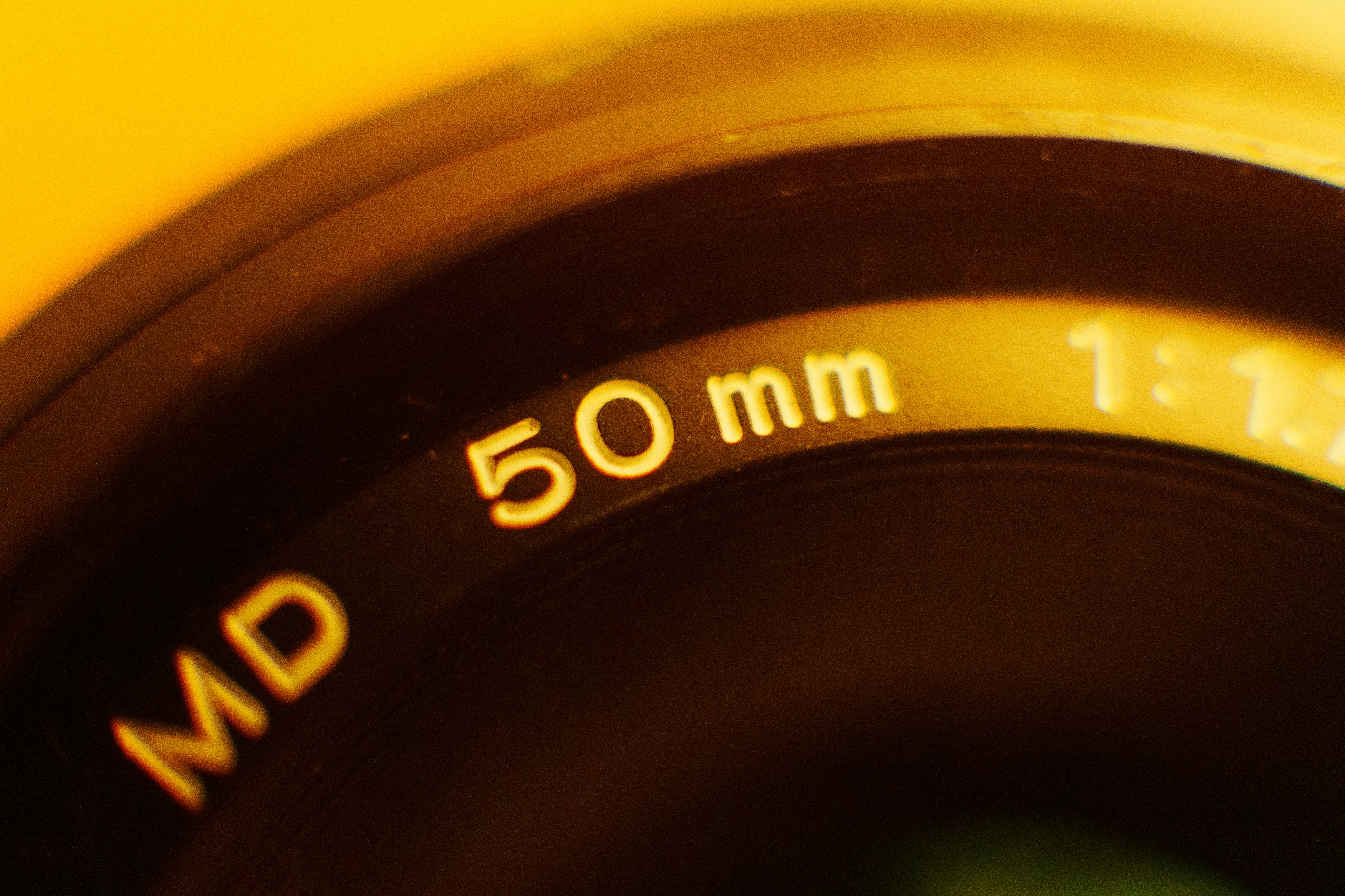 Amber Macro Focus: Minolta MD 50mm Lens Ring Close-Up