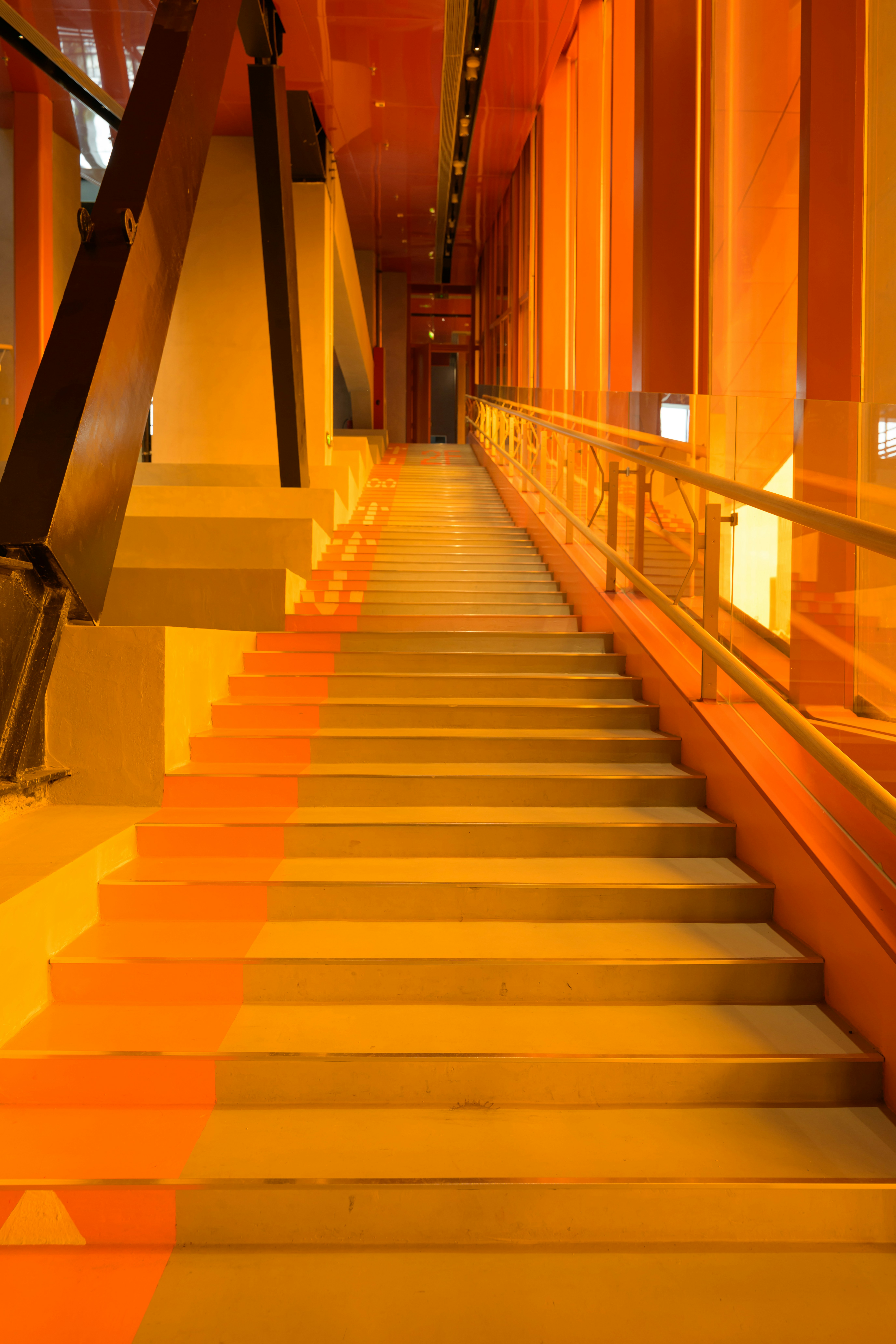 Orange Staircase to the Quiet Corridor