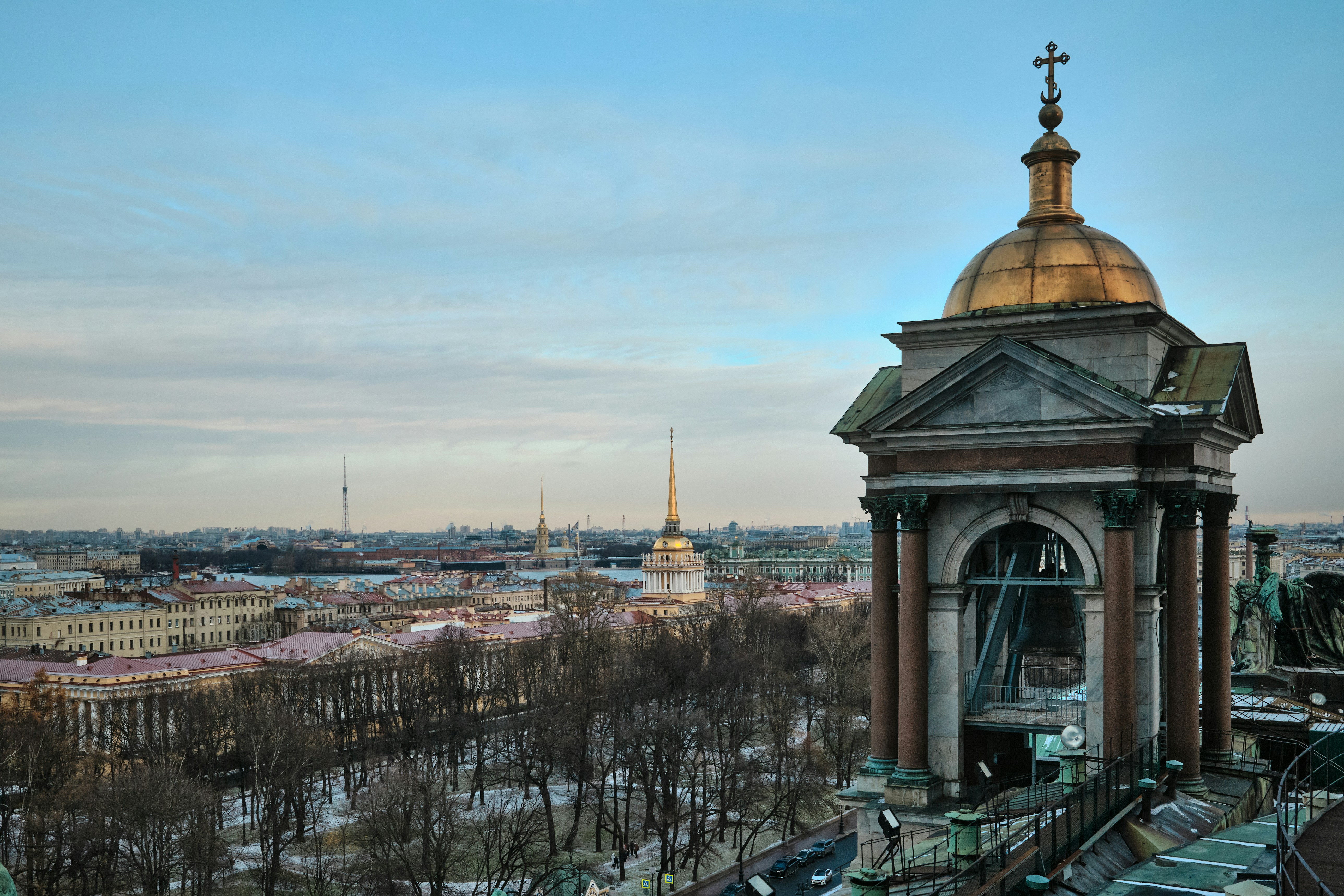 Dome Crown at Dusk: A Rooftop View Over a Golden City