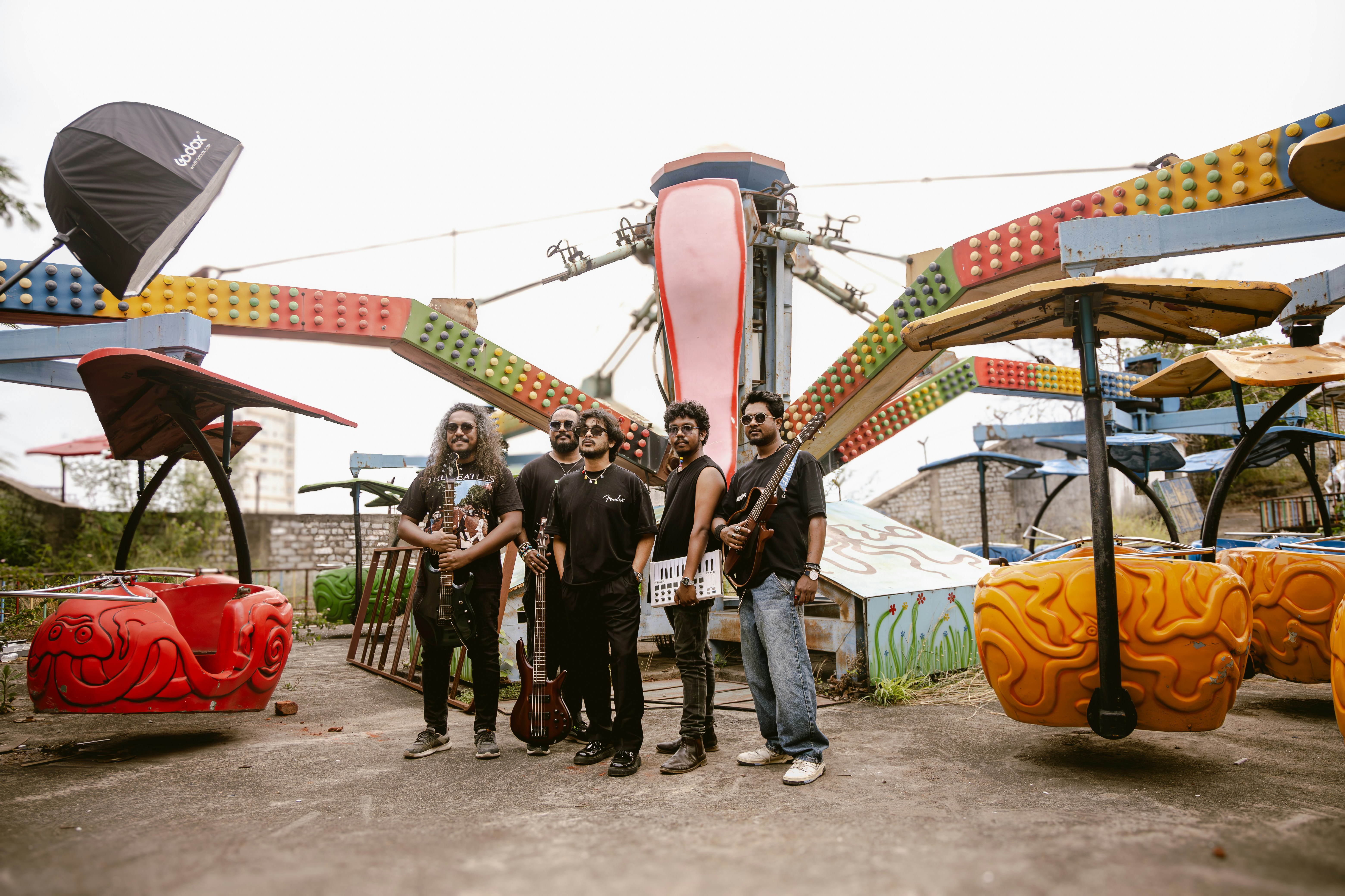 Riffs Under Kaleidoscopic Arches: A Band Portrait at a Colorful Carnival