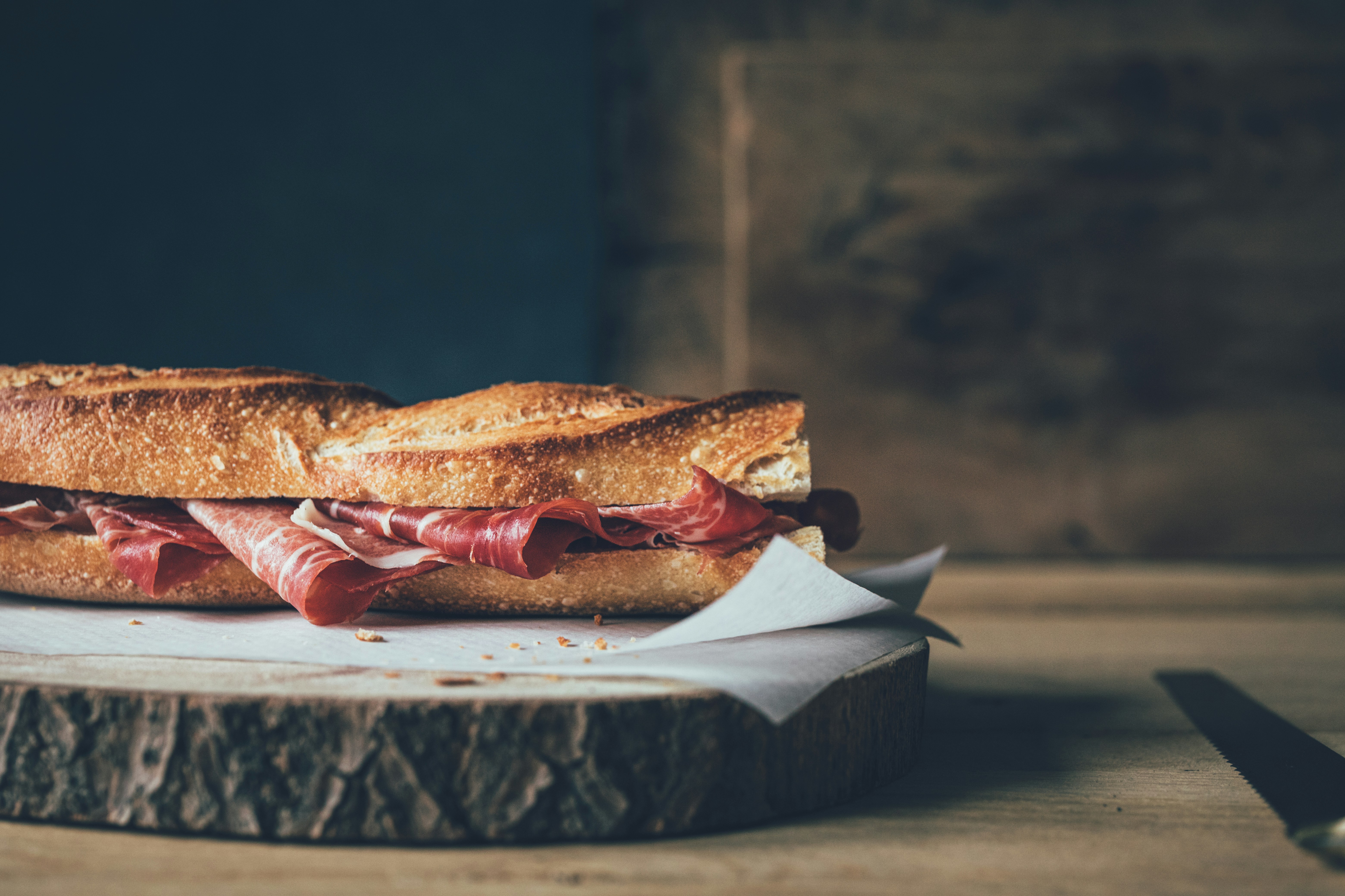 Prosciutto on a Wooden Slab: A Quiet Moment of Sandwich Craft