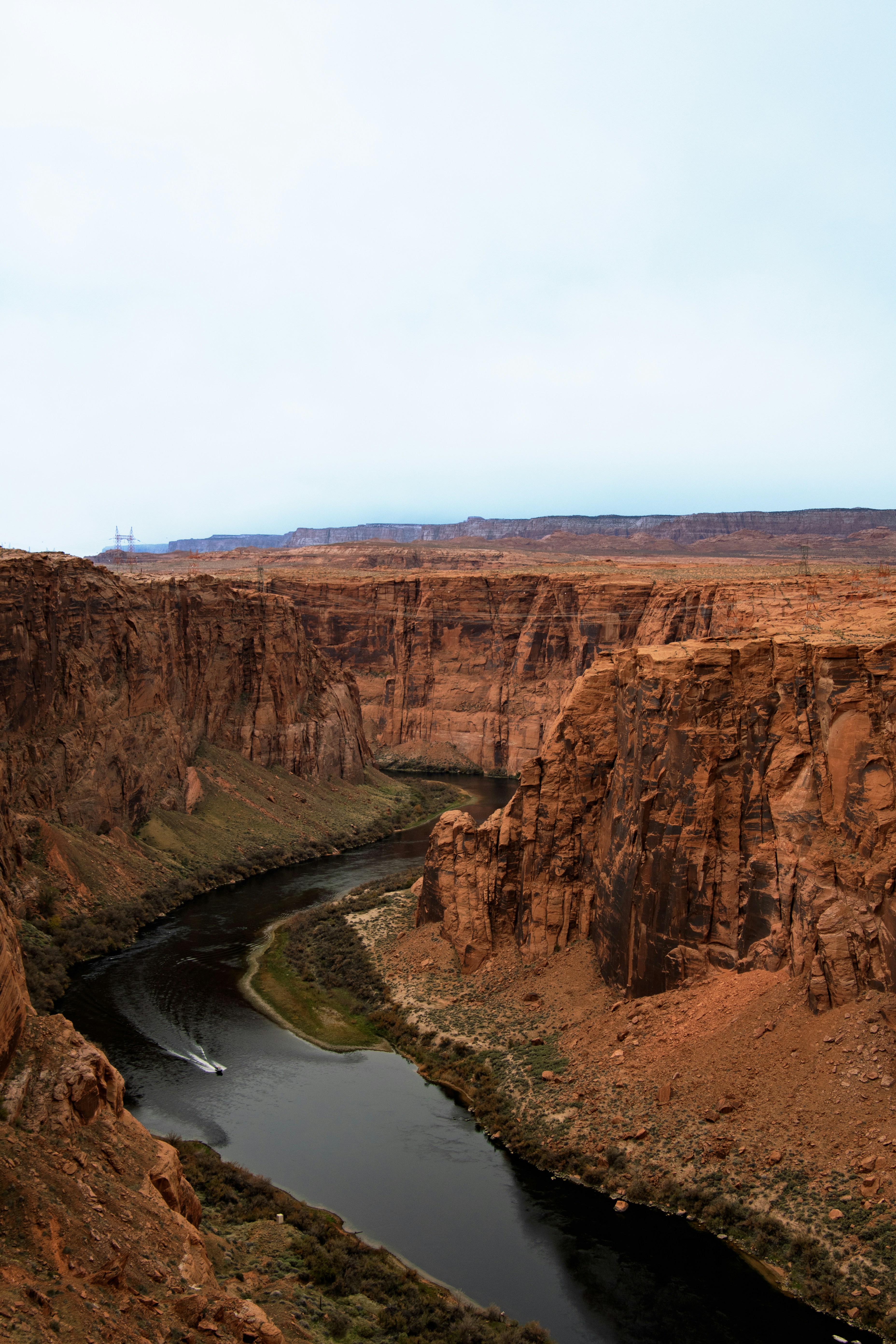A river running through a canyon surrounded by mountains photo – Free ...