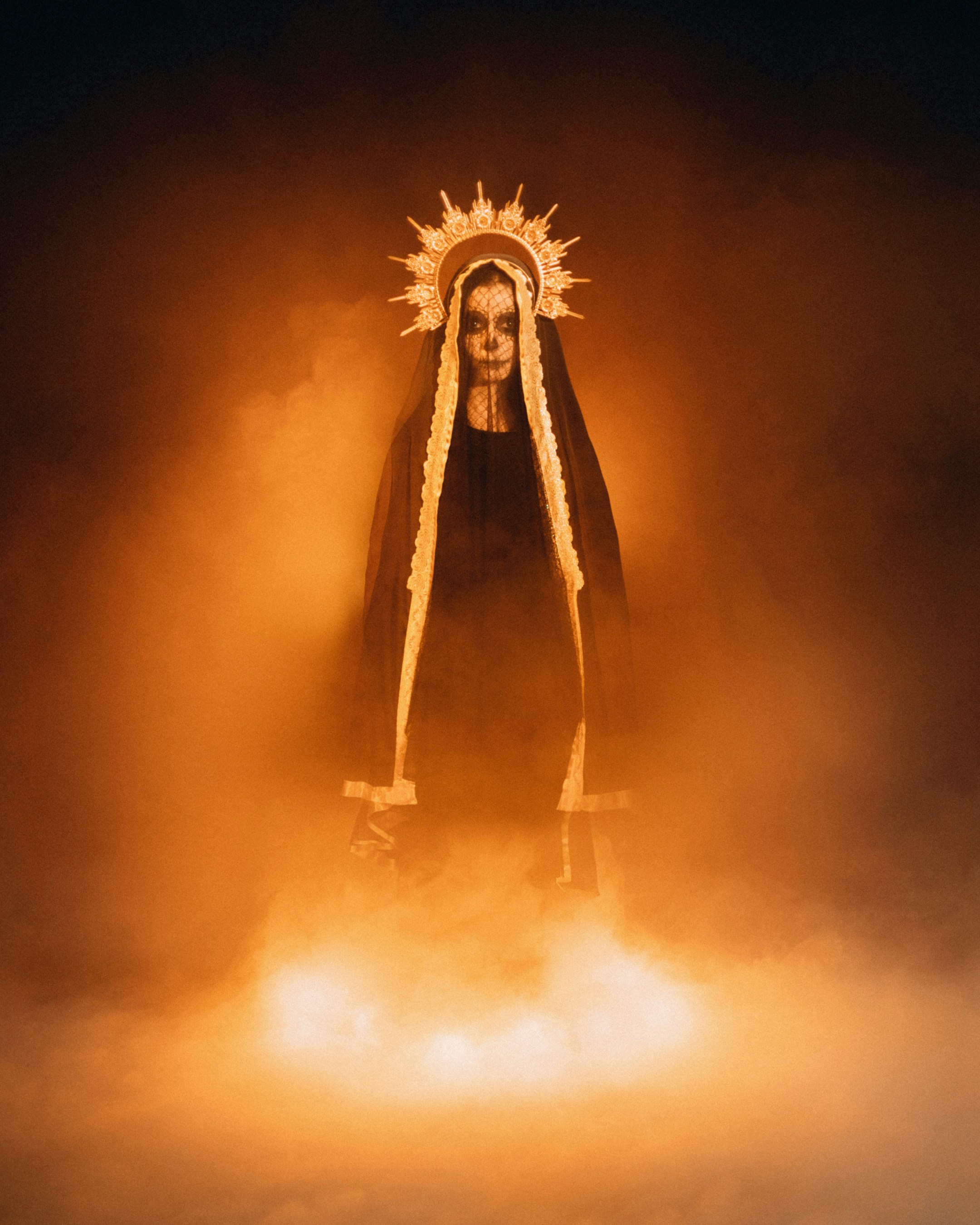A statue of the virgin mary surrounded by smoke photo – Free Mexico ...