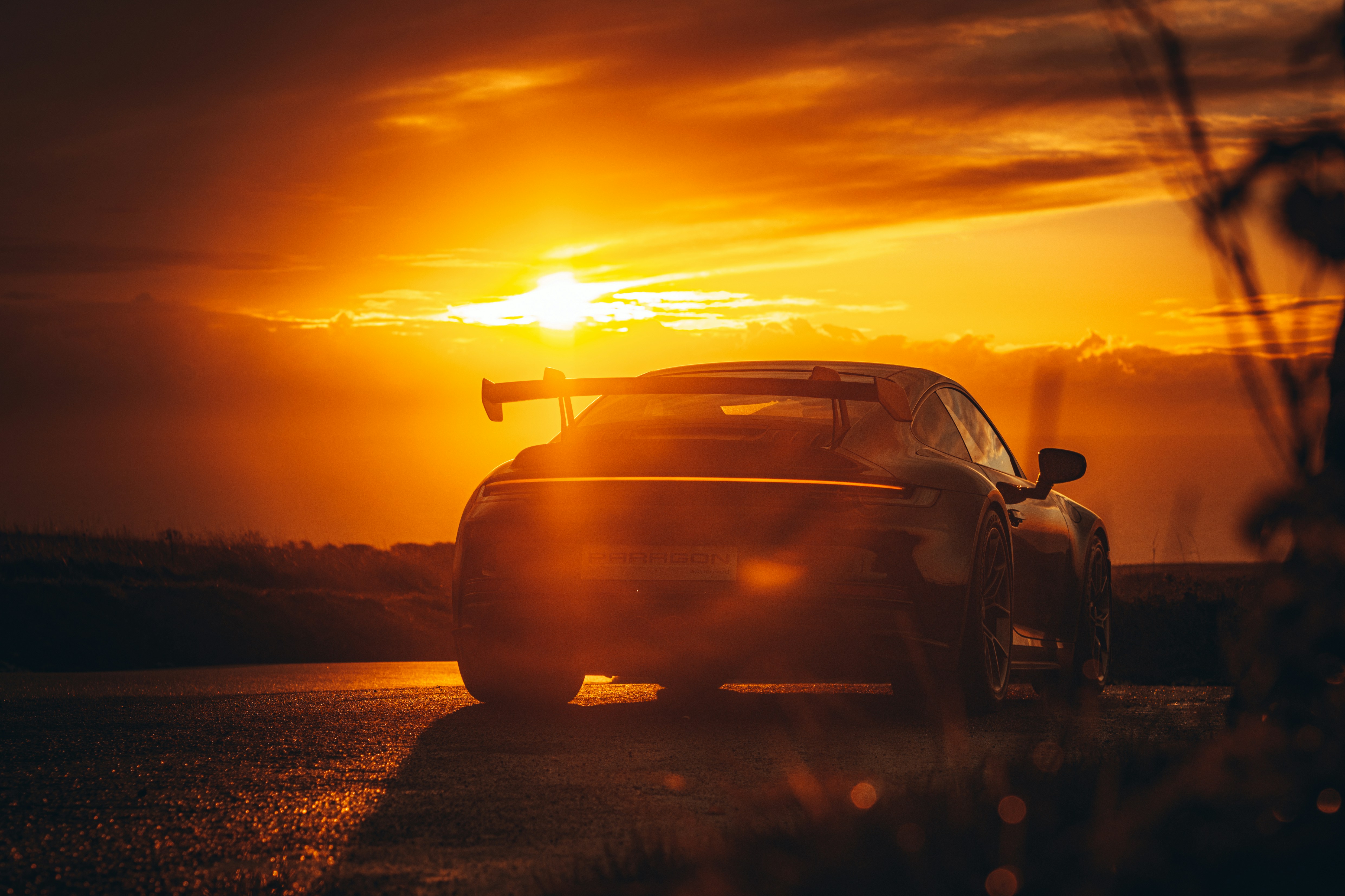A car driving down a road at sunset photo – Free Beachy head Image on ...