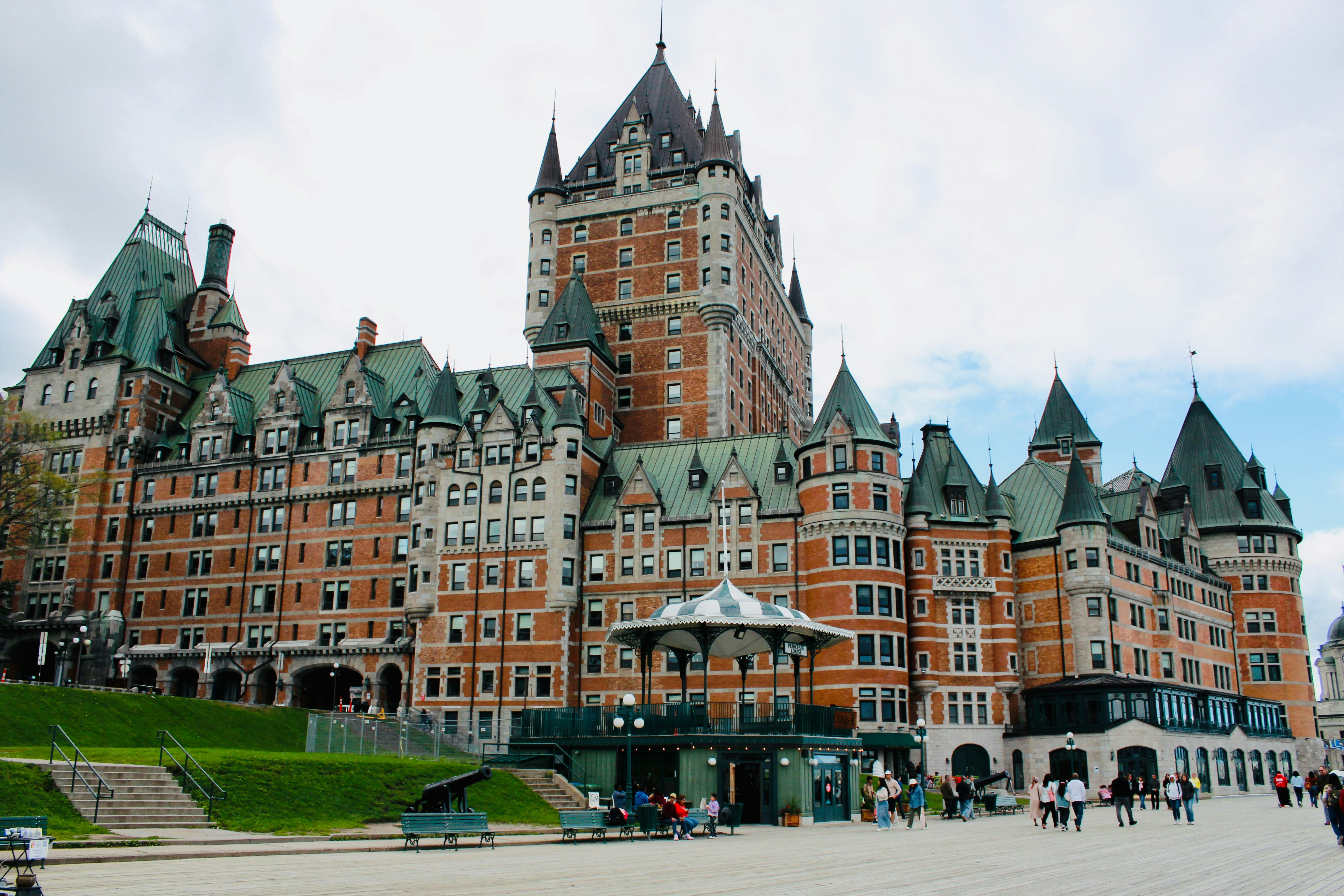 A large building with many windows and towers photo – Free Building ...