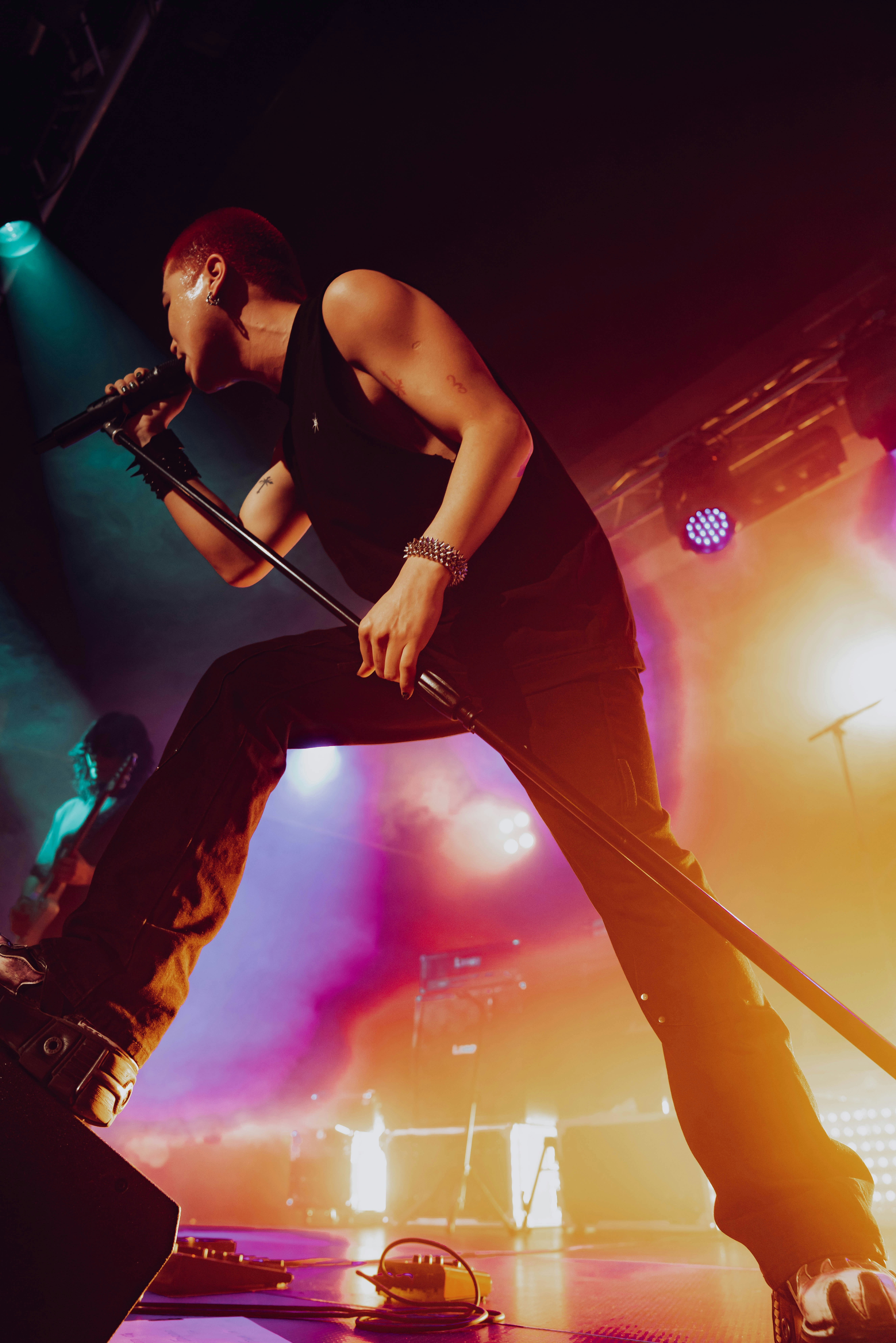 Vocal Fire on Stage: A Lead Singer Charged with Energy