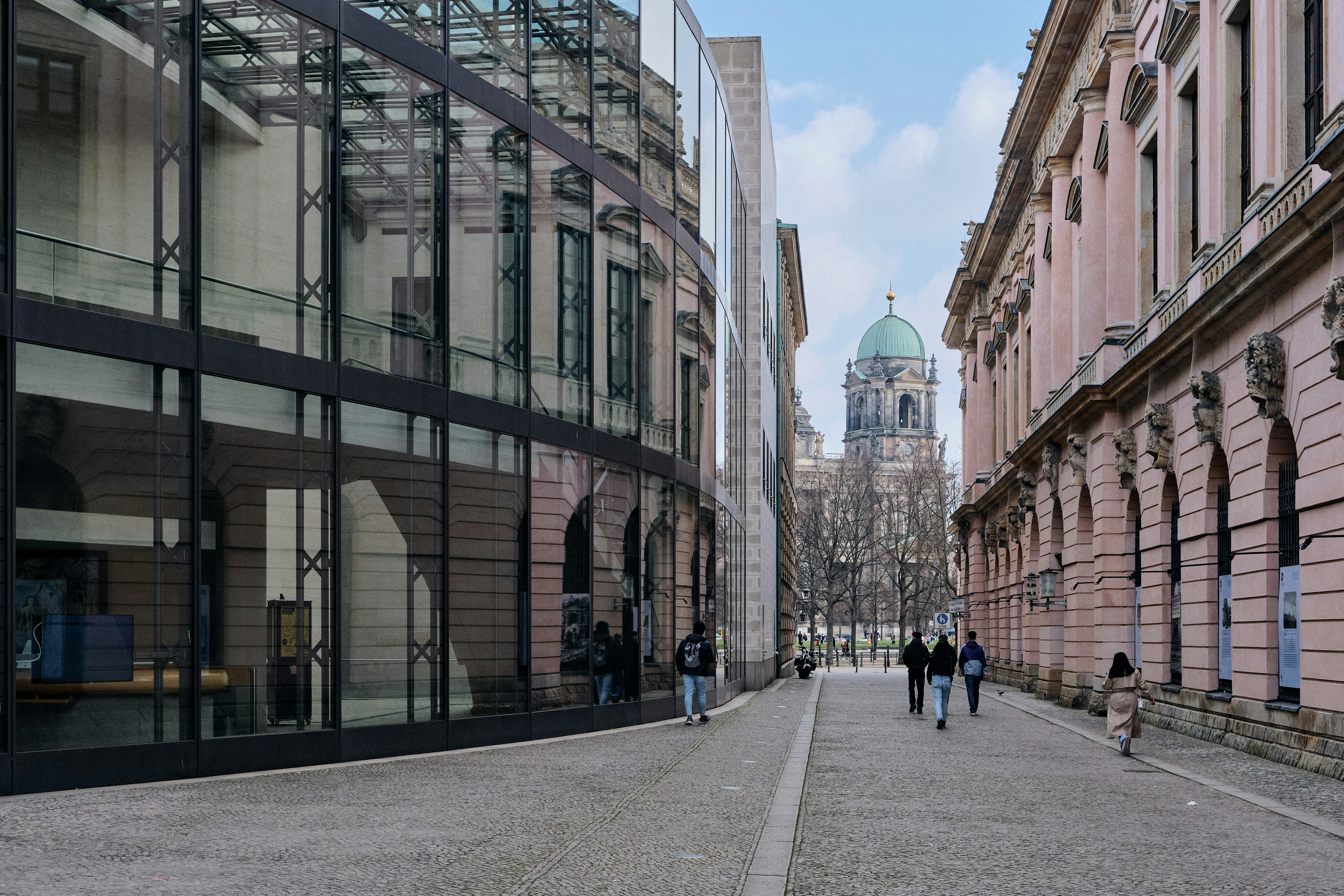 A city street with people walking down itAlireza Banijani