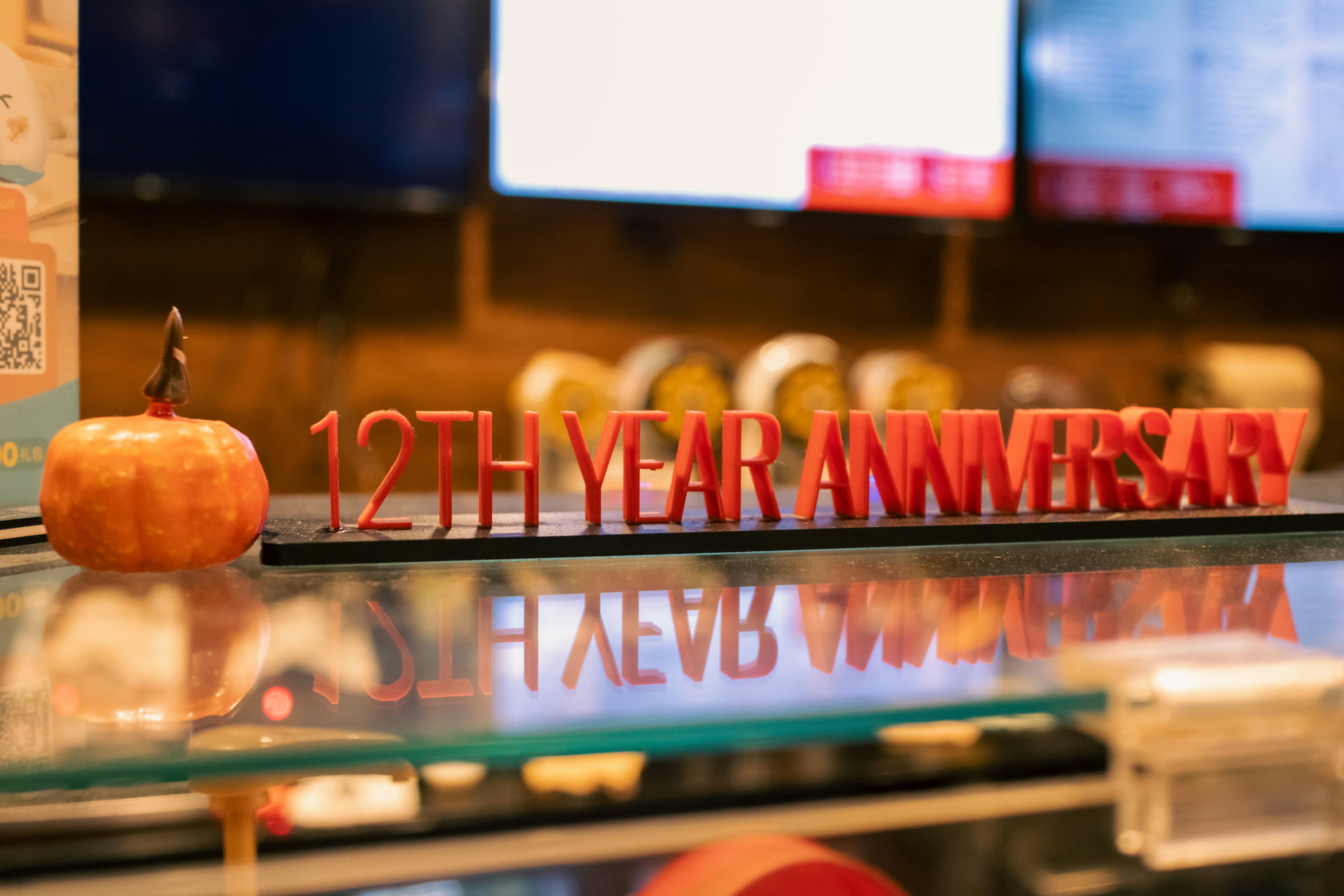 Pumpkin Glow as 12th-Year Signage Reflects on Glass