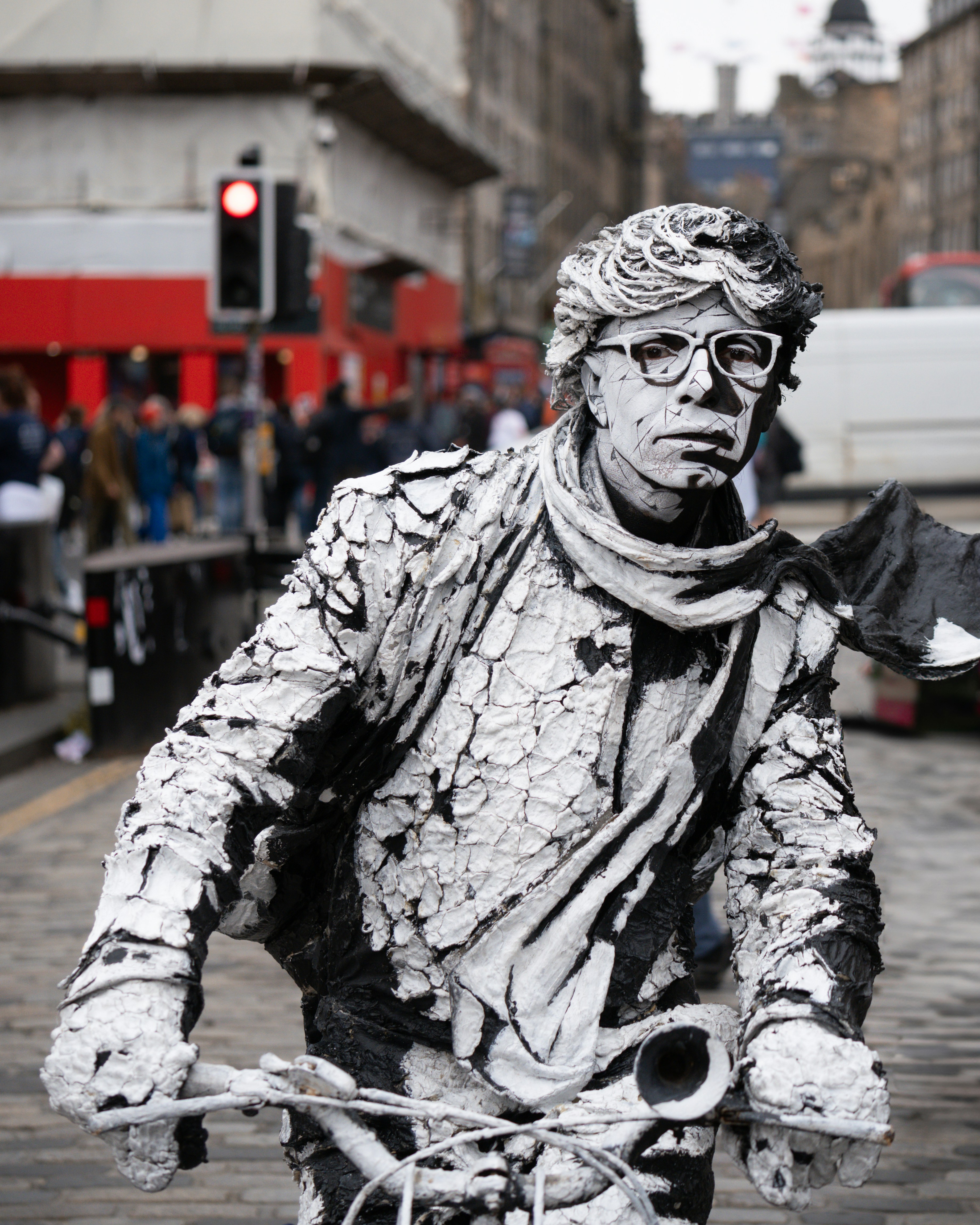 A statue of a man riding a bike down a street photo – Free Edinburgh ...