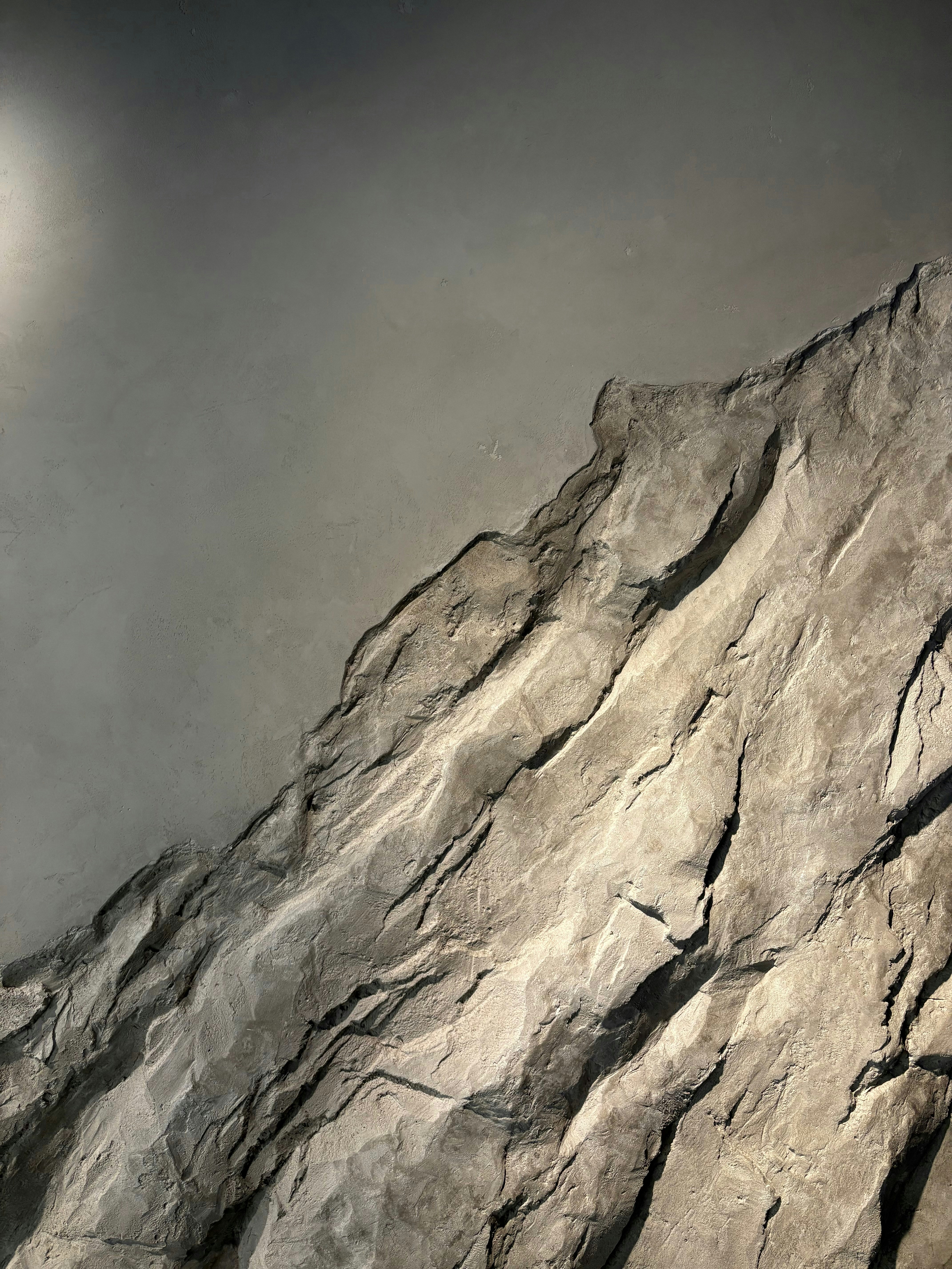 Angular Cliffs: A Quiet Bedrock Rise beneath a Dim Sky