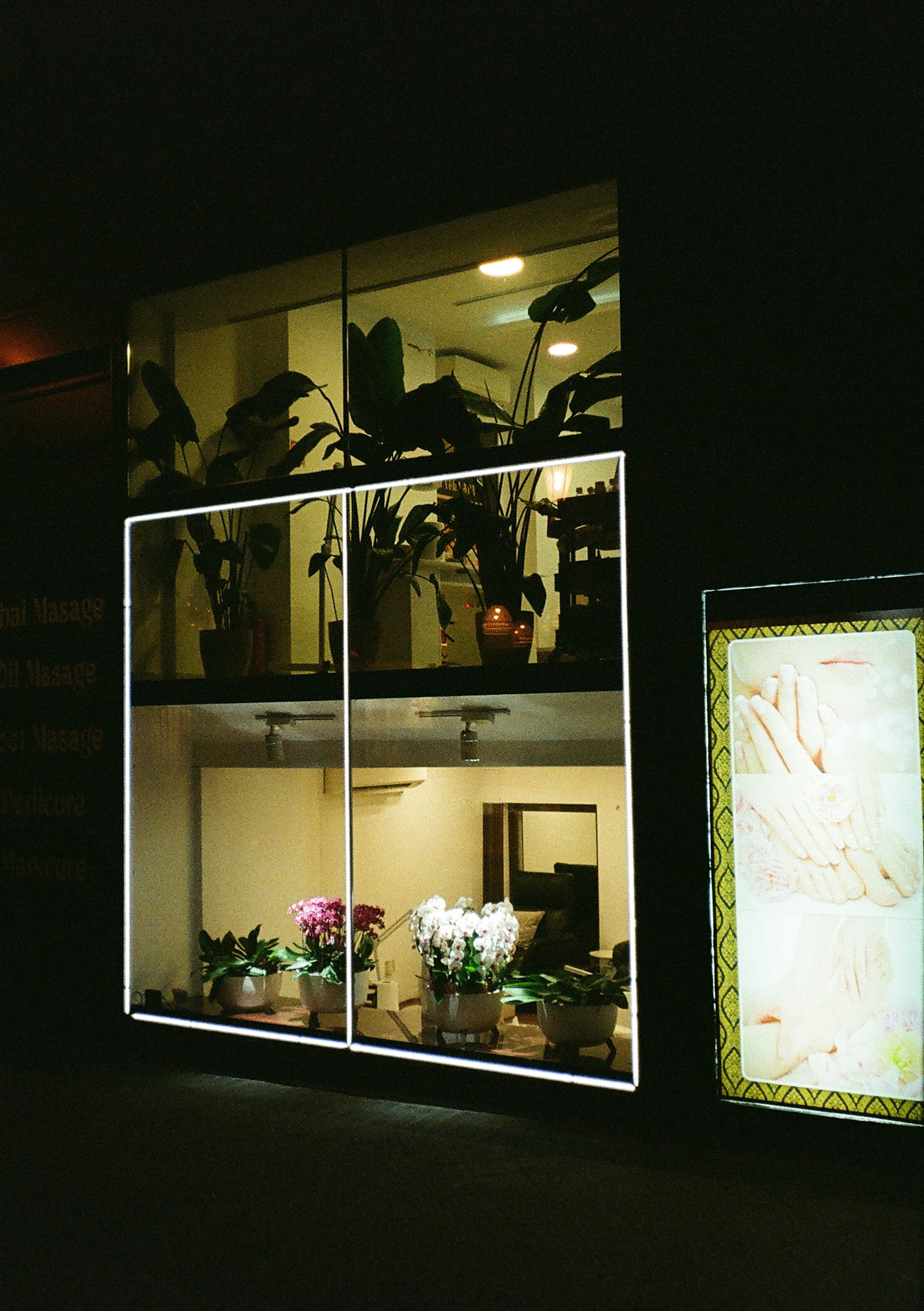 A building with a lit up window at night photo – Free Budapest Image on ...