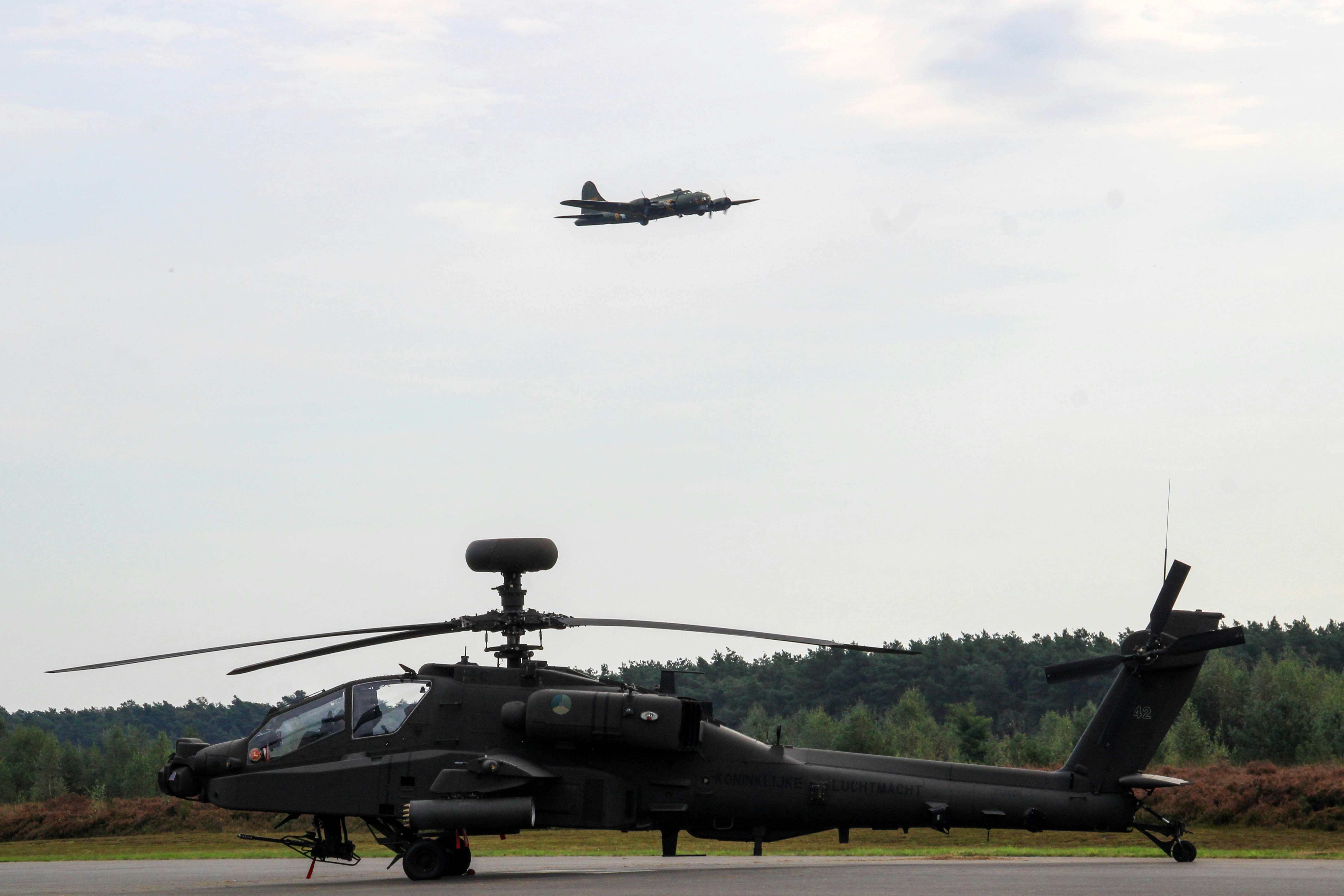 A helicopter and a jet flying in the sky photo – Free Helicopter Image ...