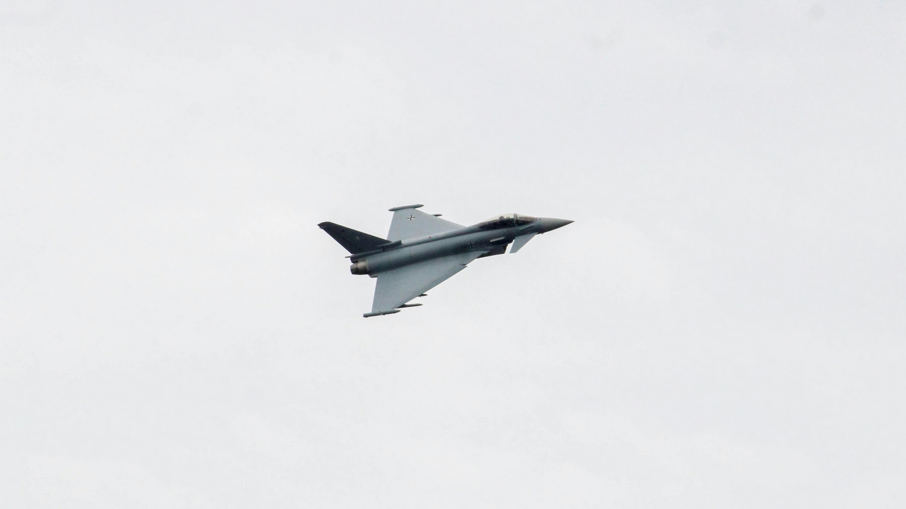 Arc of the Silver Arrow Across a Quiet Sky