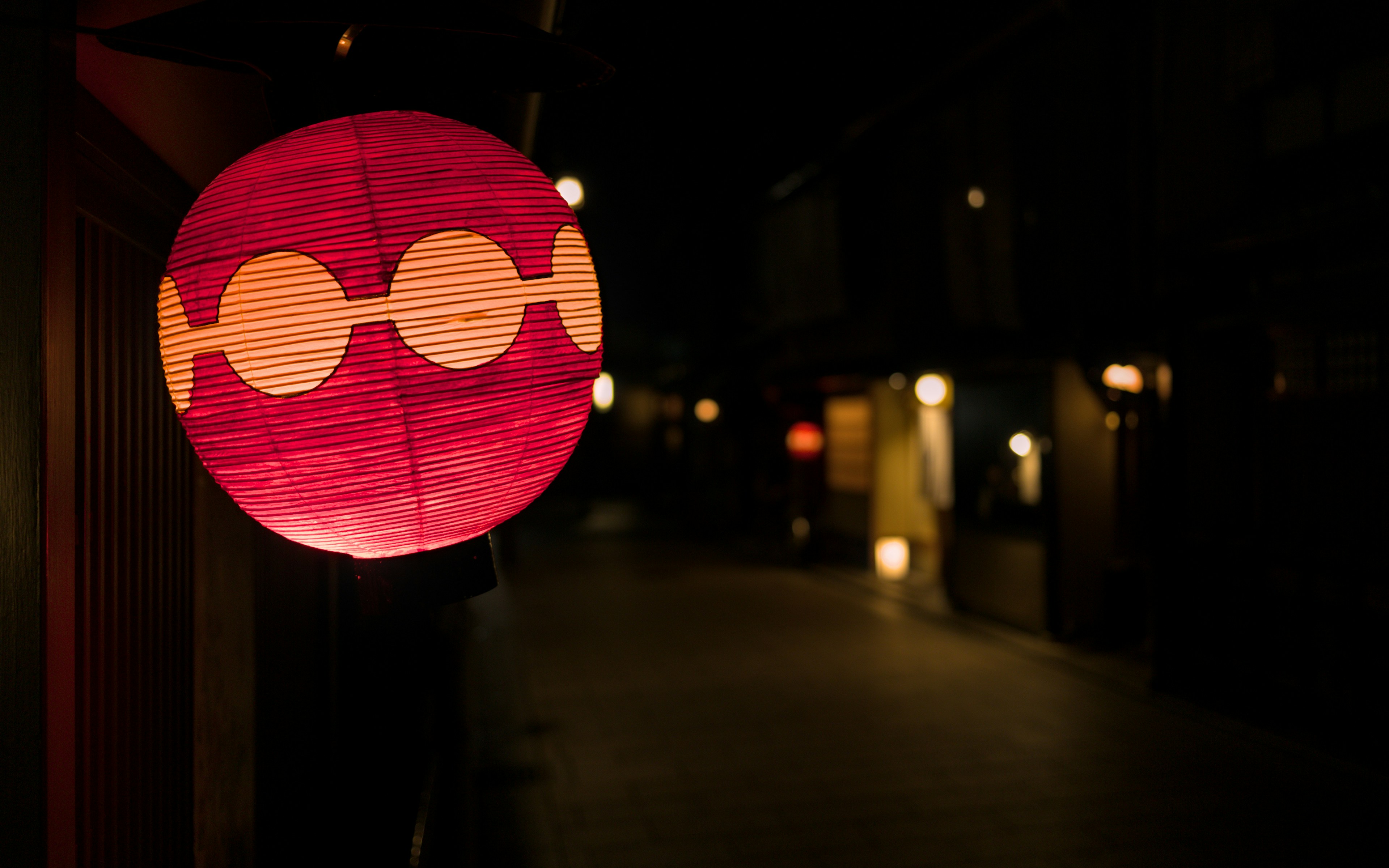Scarlet Lantern at the Threshold of a Quiet Alley