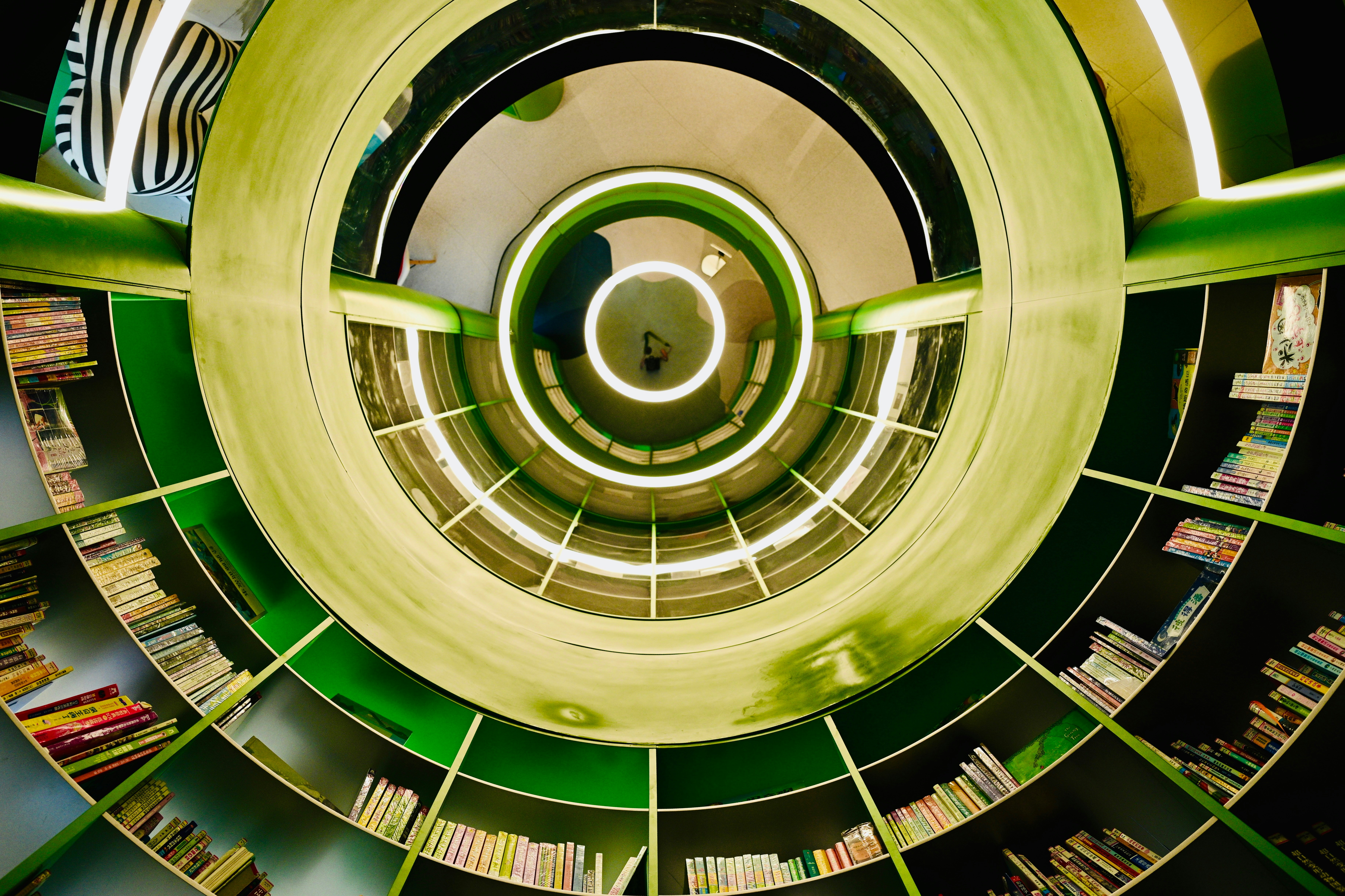 A spiral view of a bookshelf filled with books