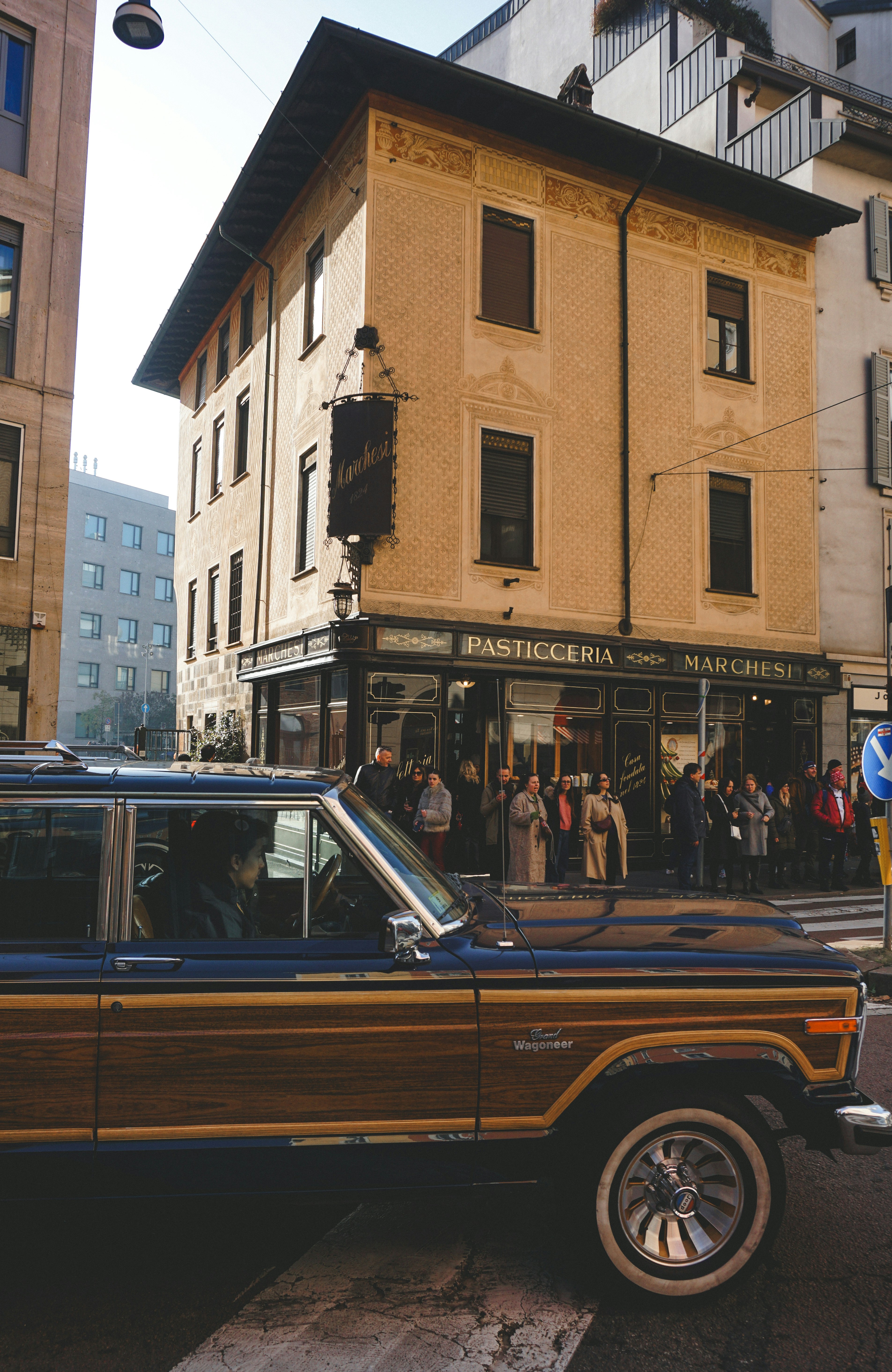 Pastel Facade, Vintage Wagon: Street Life by Pasticceria Marchesi