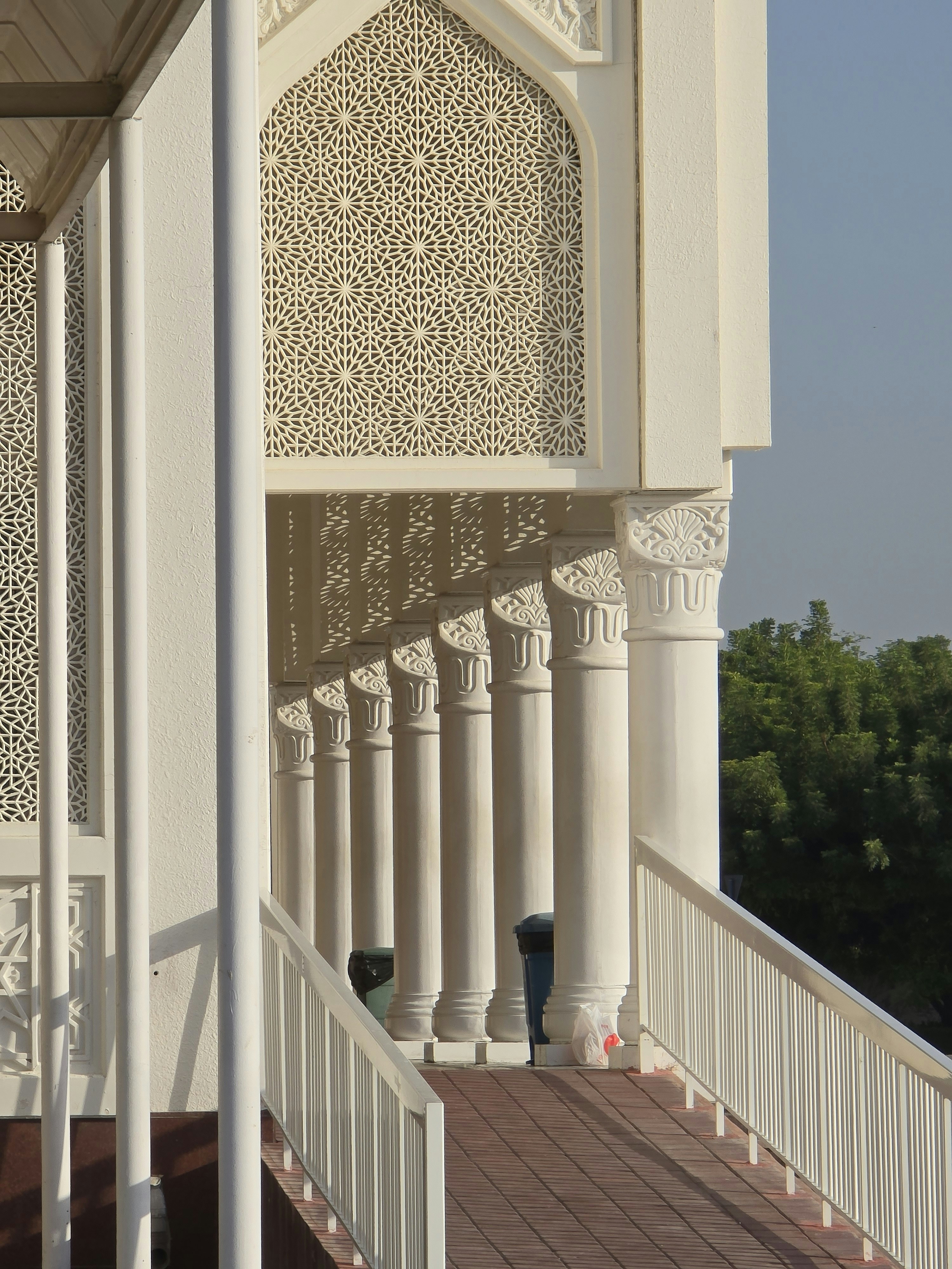 Colonnade in Soft Light: Framed Arches and Latticed Panels