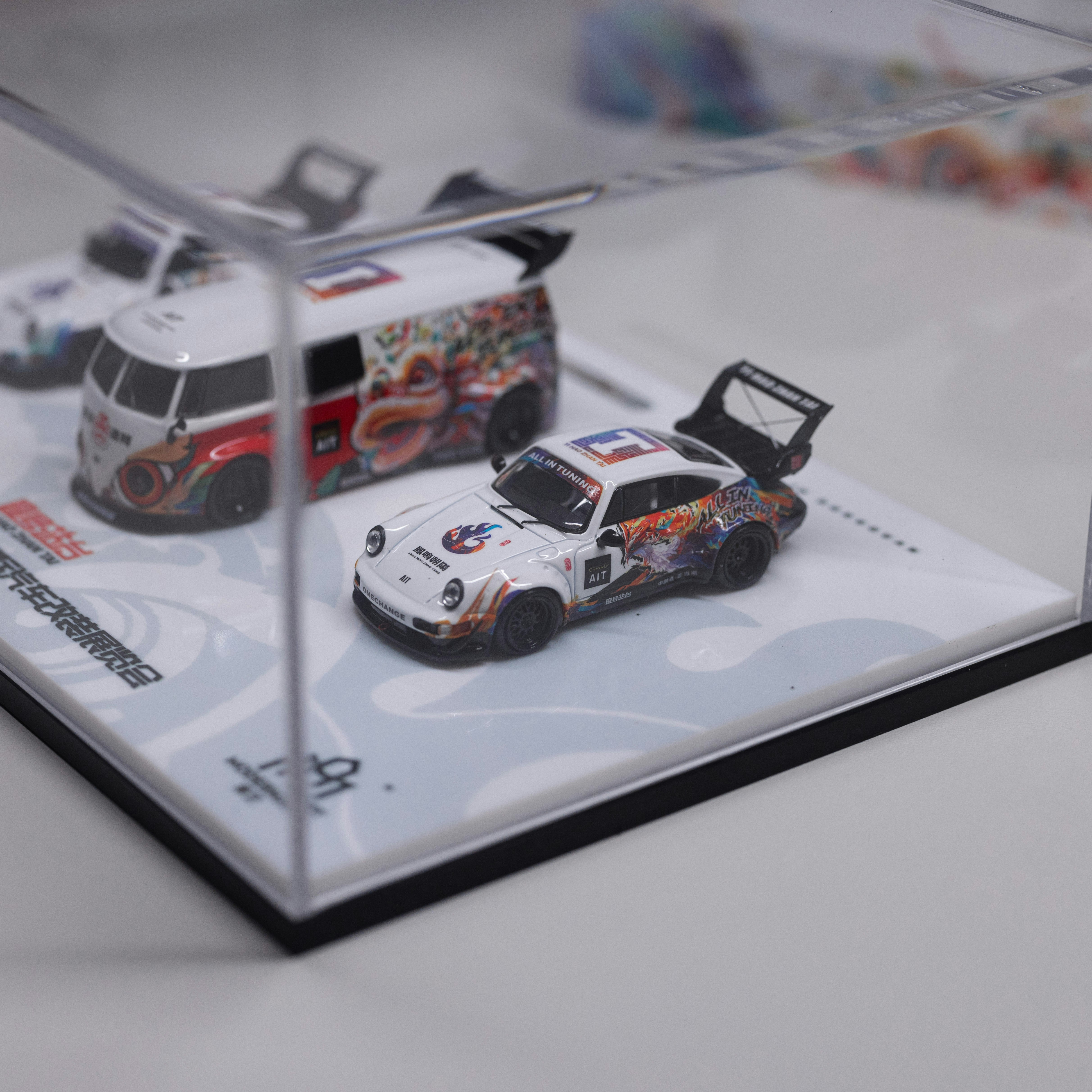 A close up of two toy cars in a display case photo – Free Die cast toy ...