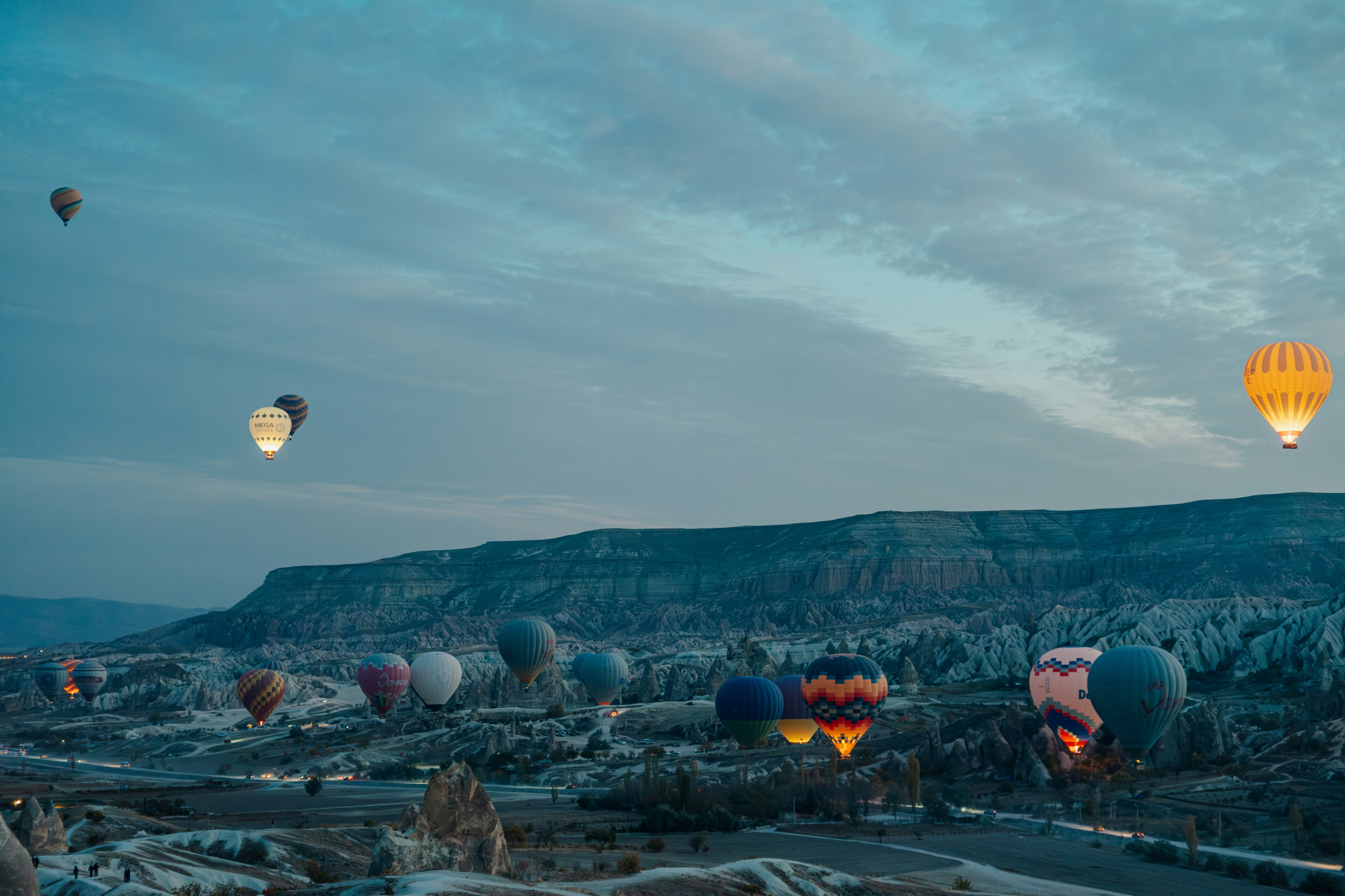 Flotilla Over Cappadocia's Carved Valley at Daybreak