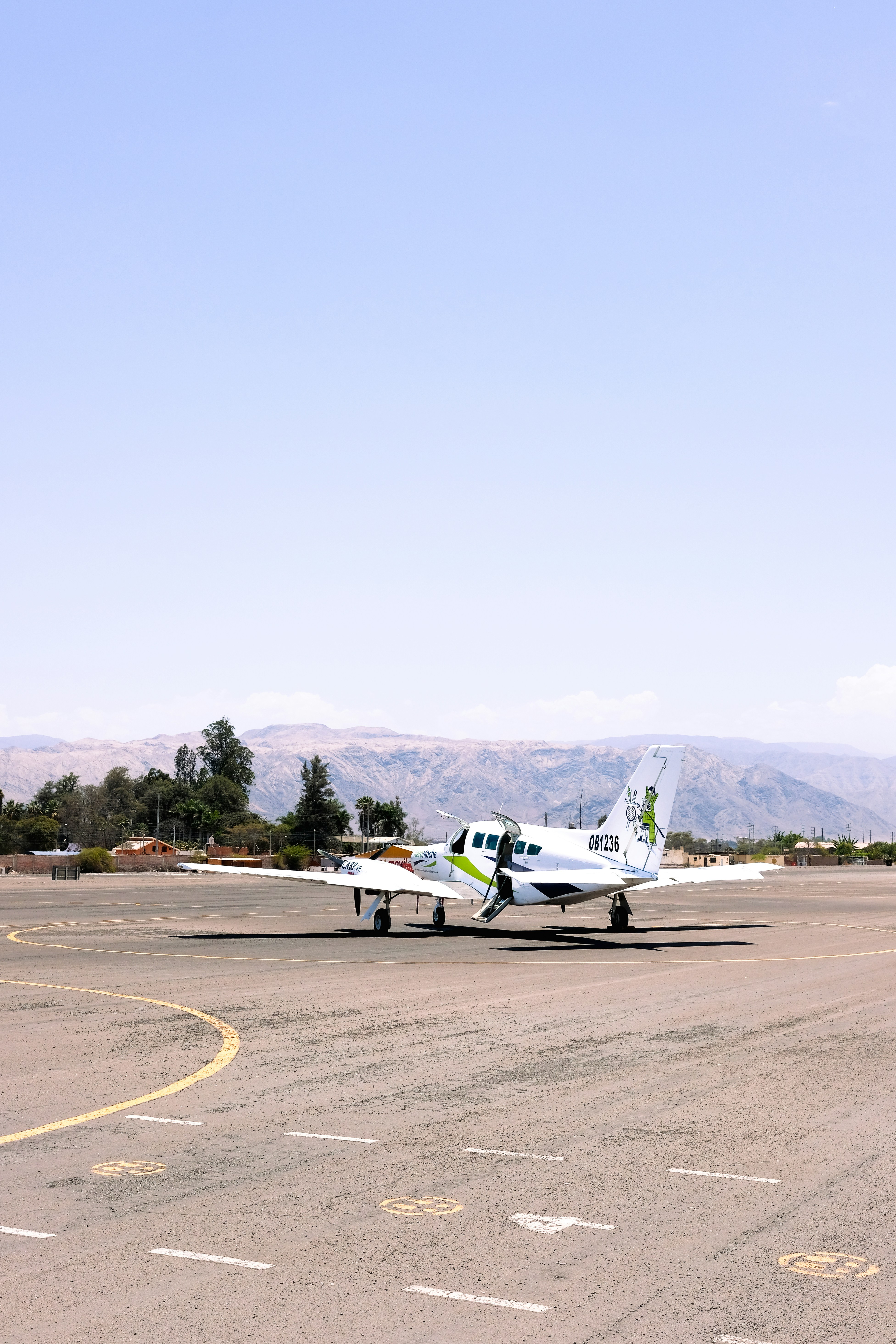 A small plane is sitting on the runway photo – Free Human Image on Unsplash