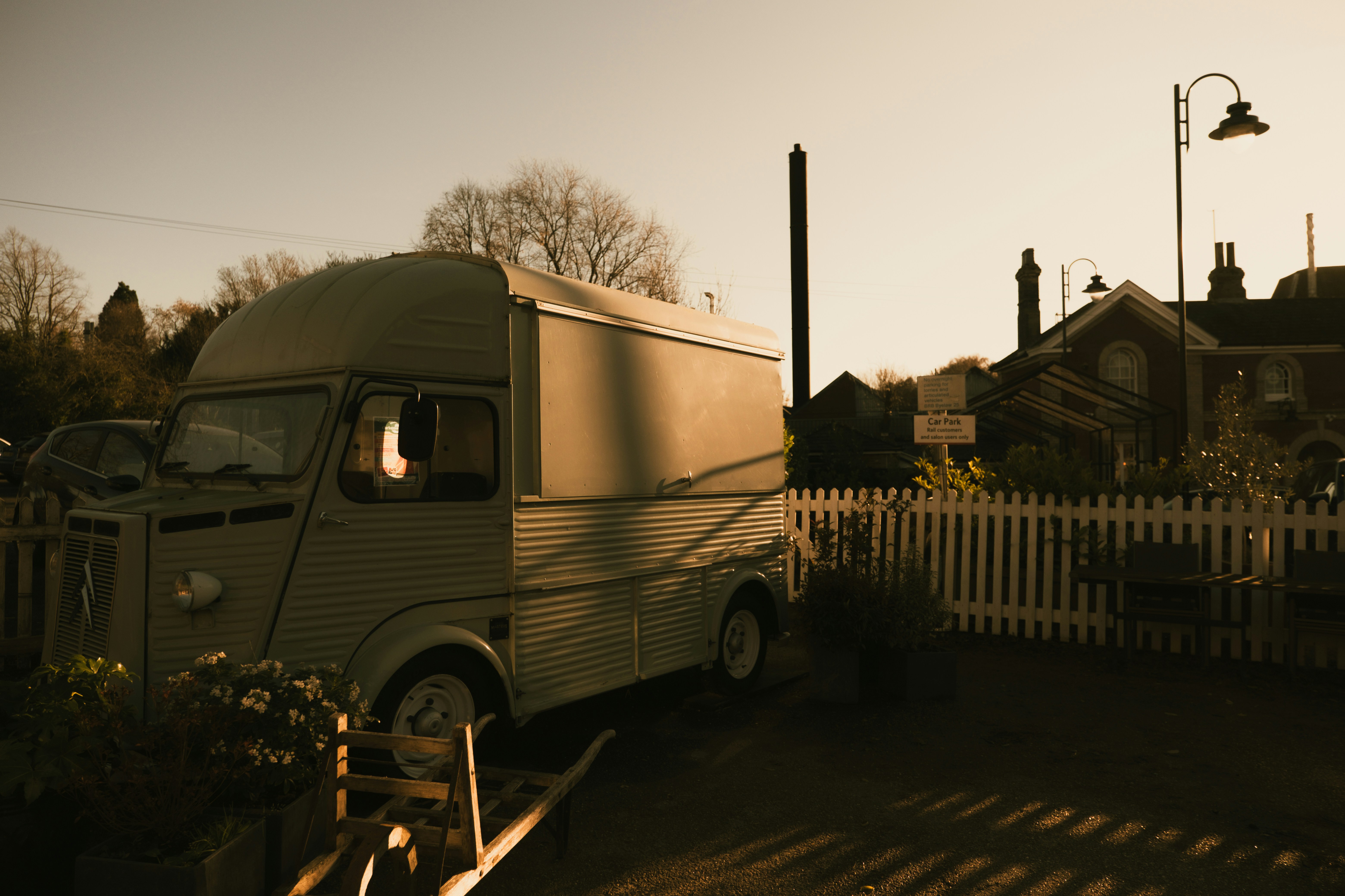 Amber Hour on a Quiet Street: A Vintage Van in Focus
