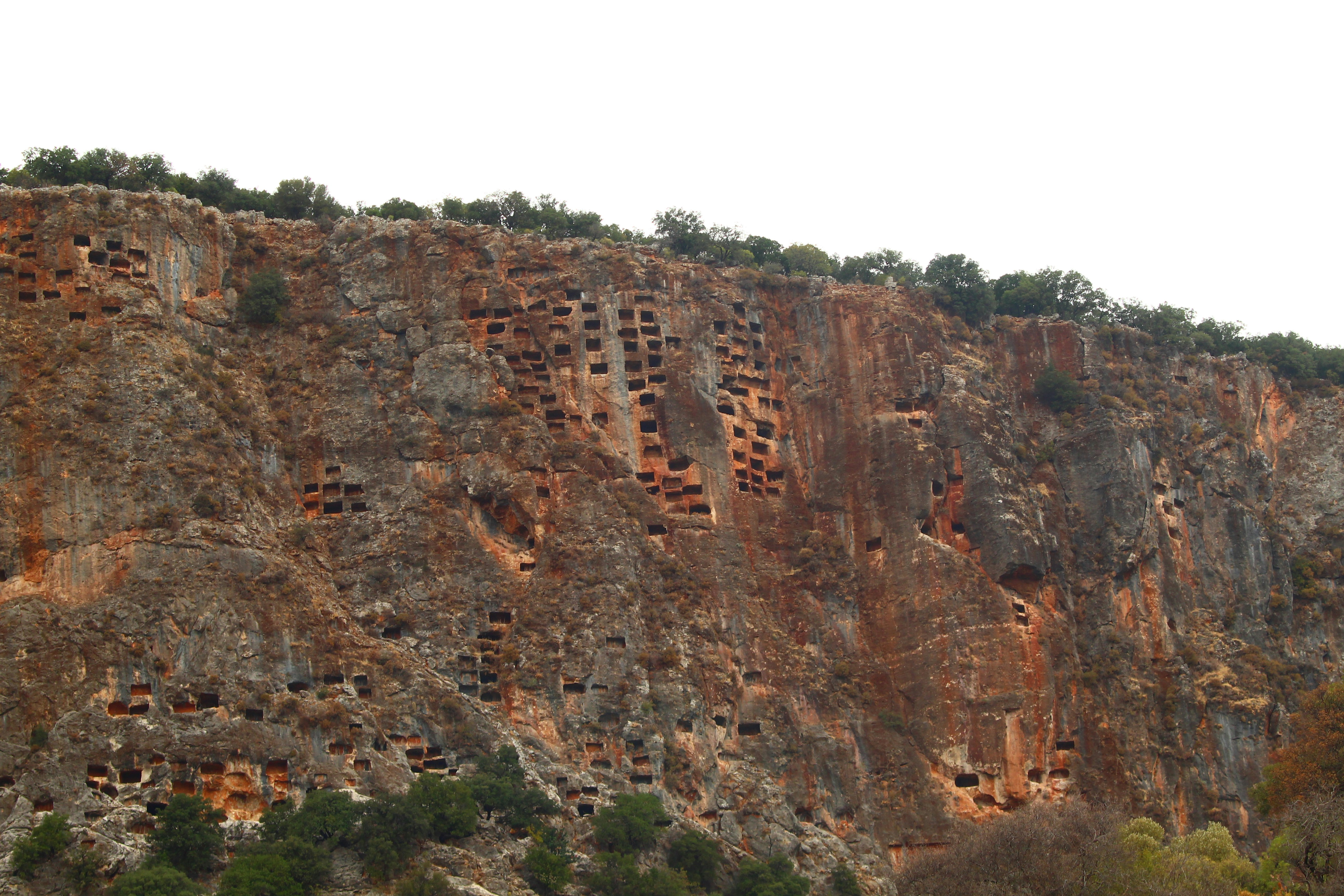 Hollows on the Red Ridge: Carved Dwellings in a Cliff Face