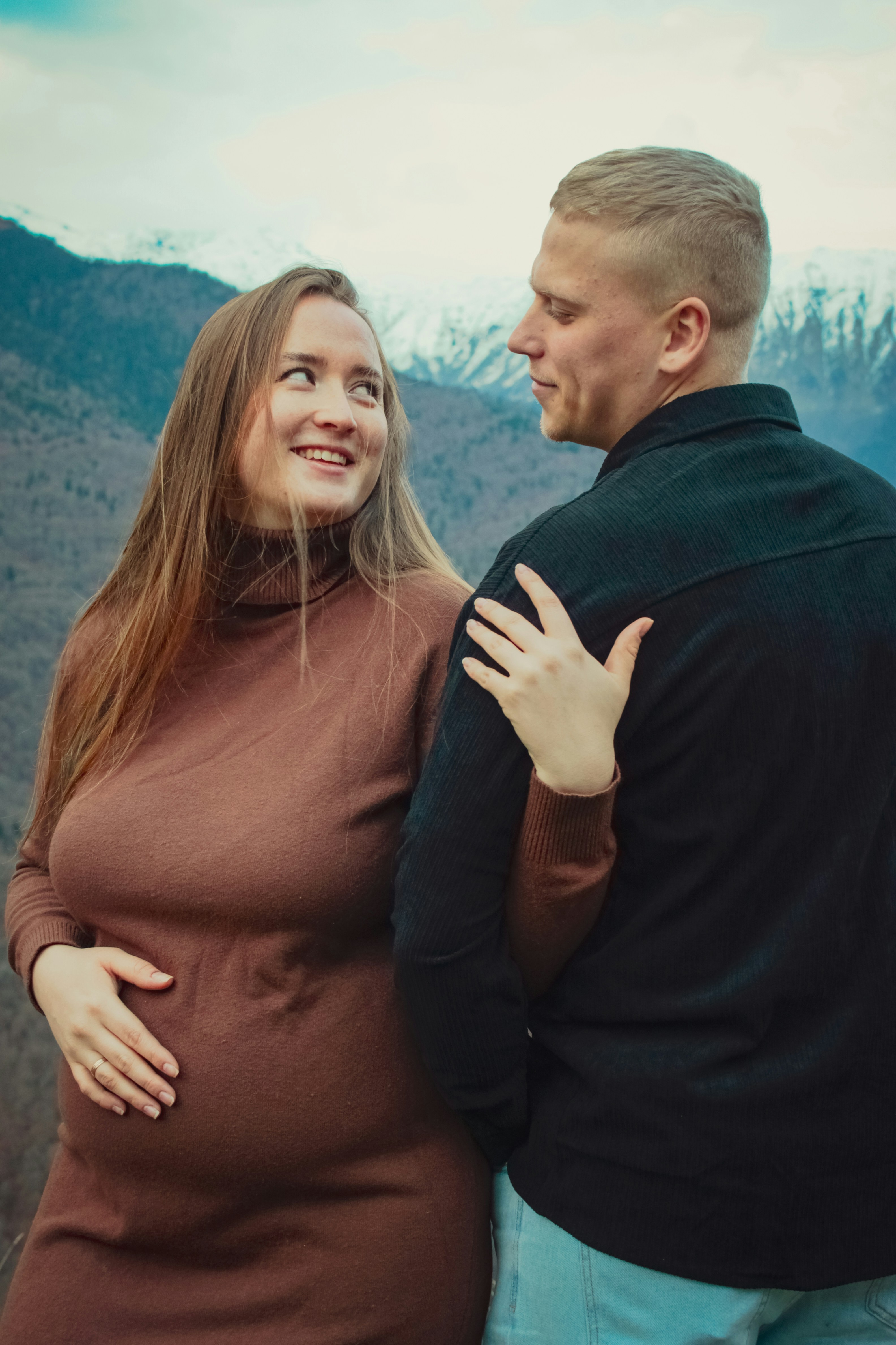 A man and a woman standing next to each other photo – Free Portrait ...