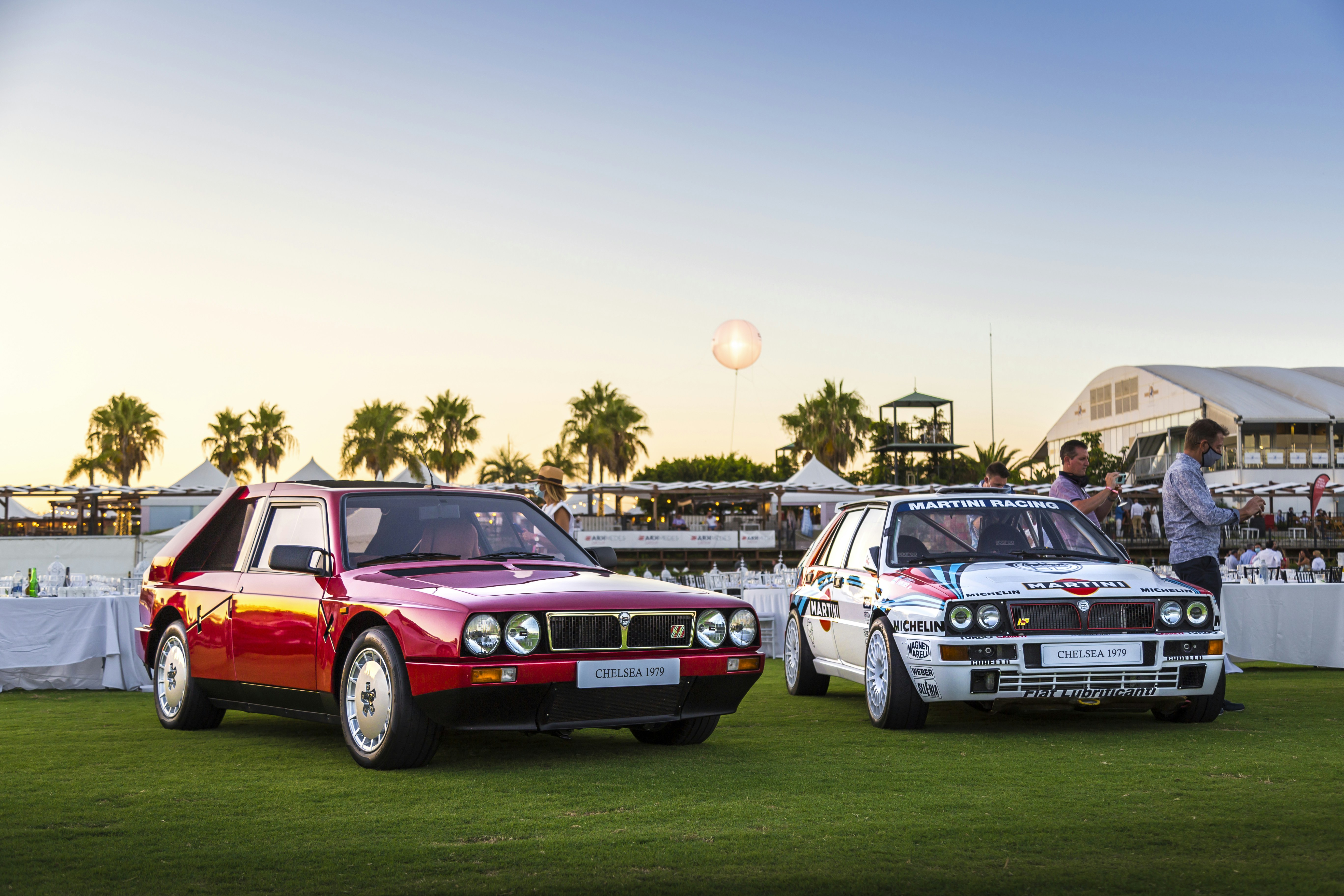 Lawnside Rally Duo: Sunset Light on Two Classic Italian Rally Sedans