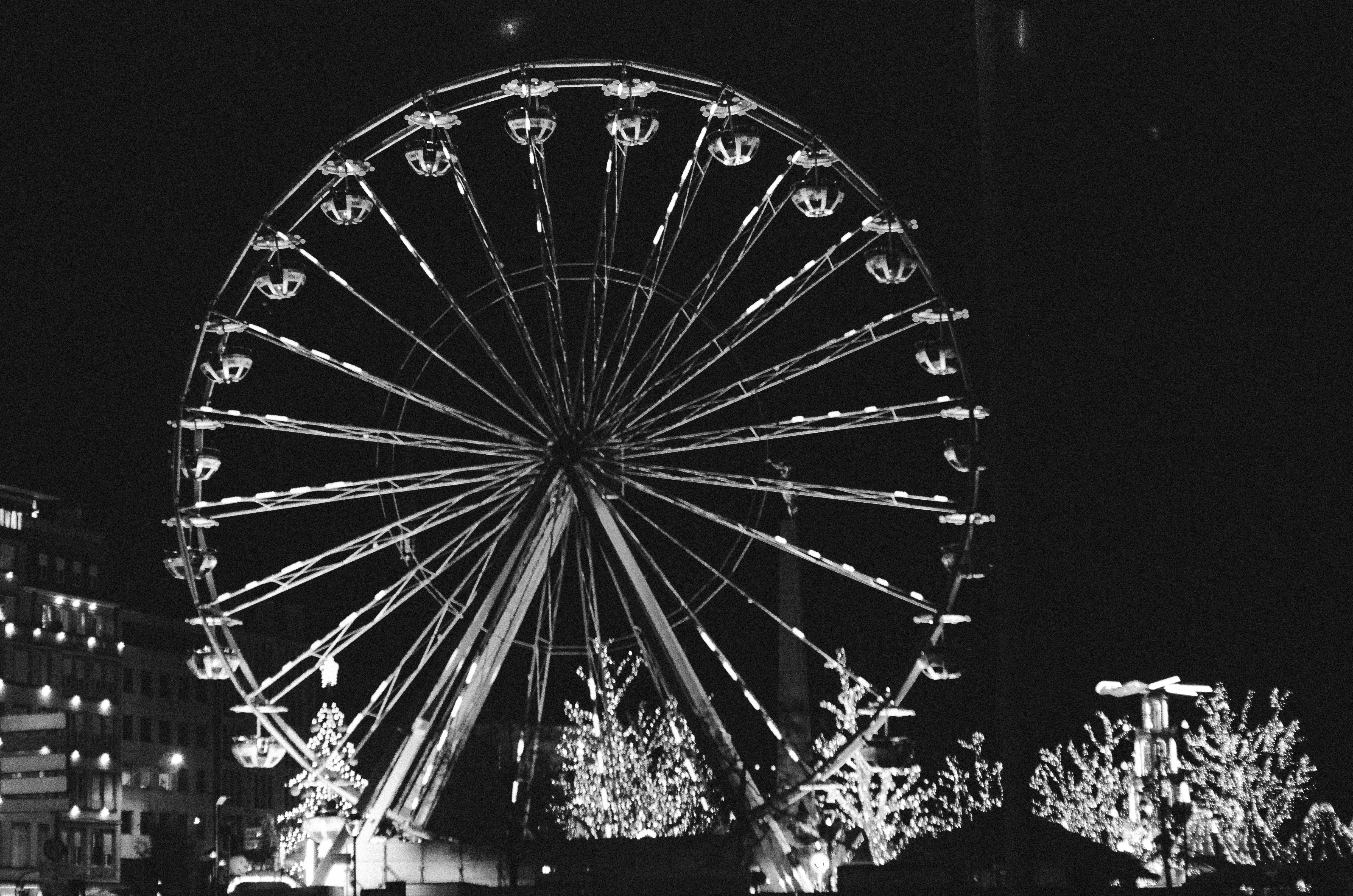 Ferris Wheel Halo Over a Quiet City Night