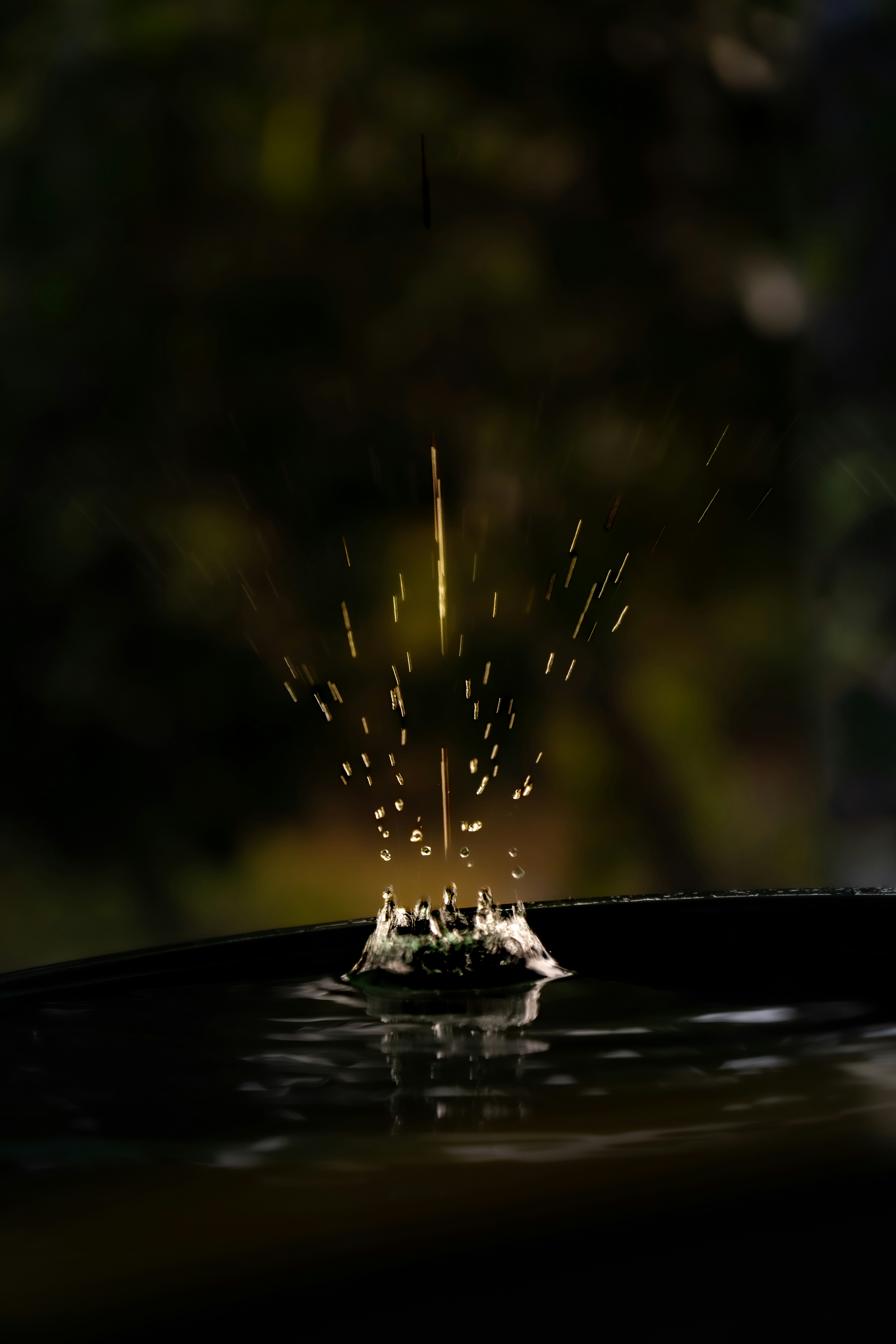 A fountain with a sprinkle of water coming out of it photo – Free ...