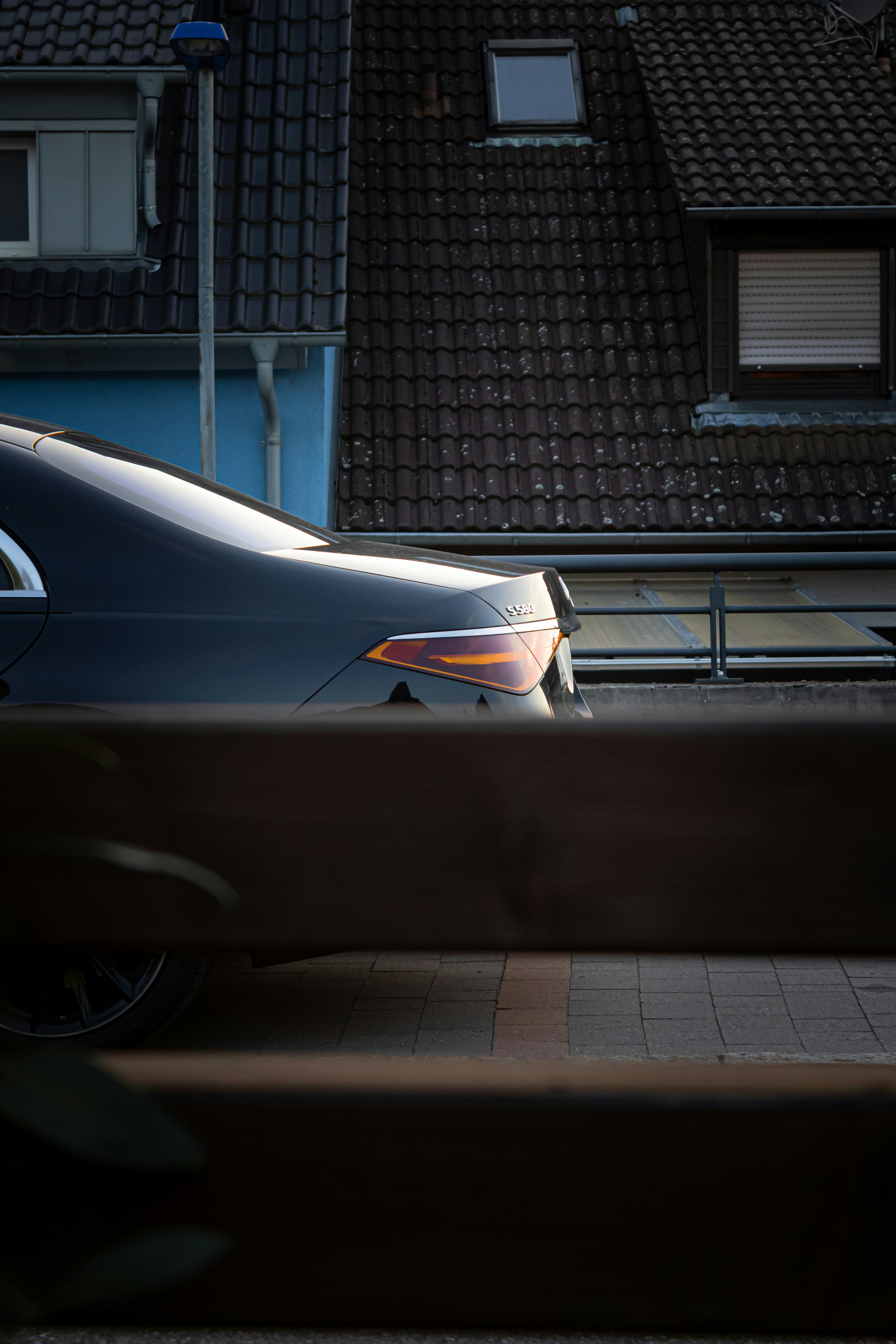 Tail Light Horizon: Urban Quiet with a Neon Slide of Blue