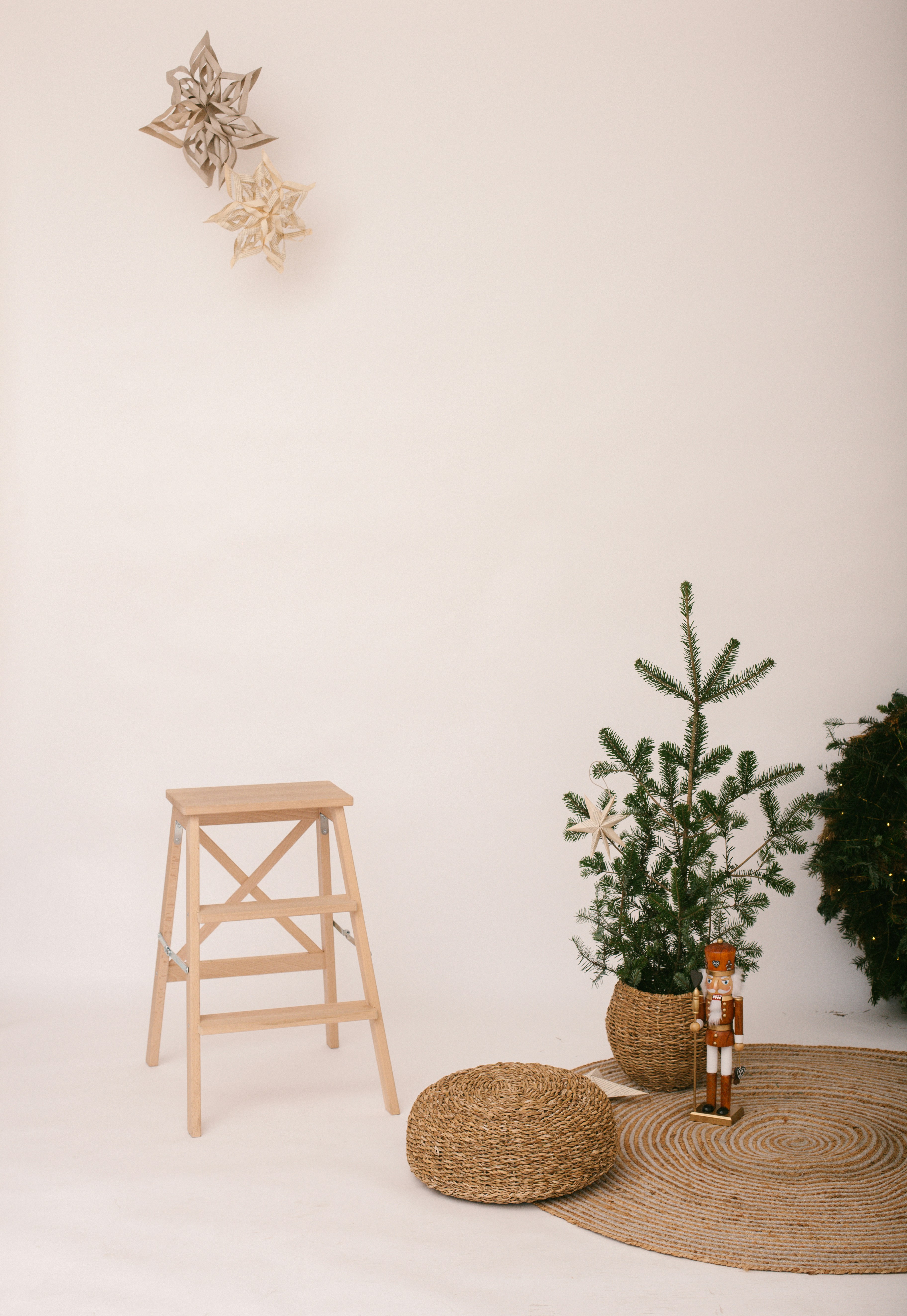 A white room with a wooden stool and a small tree photo – Free ...
