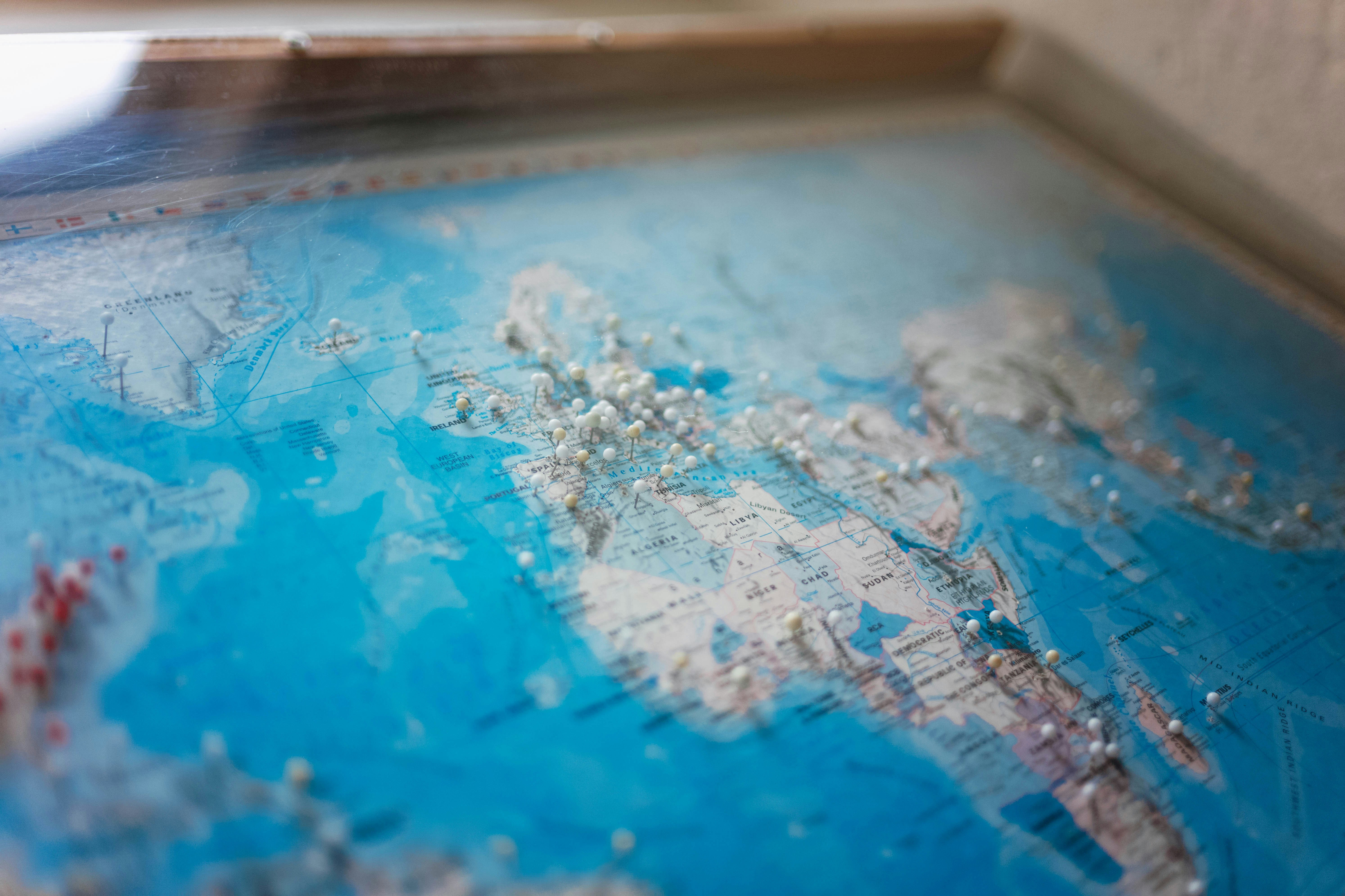 A close up of a map on a table photo – Free Pool Image on Unsplash