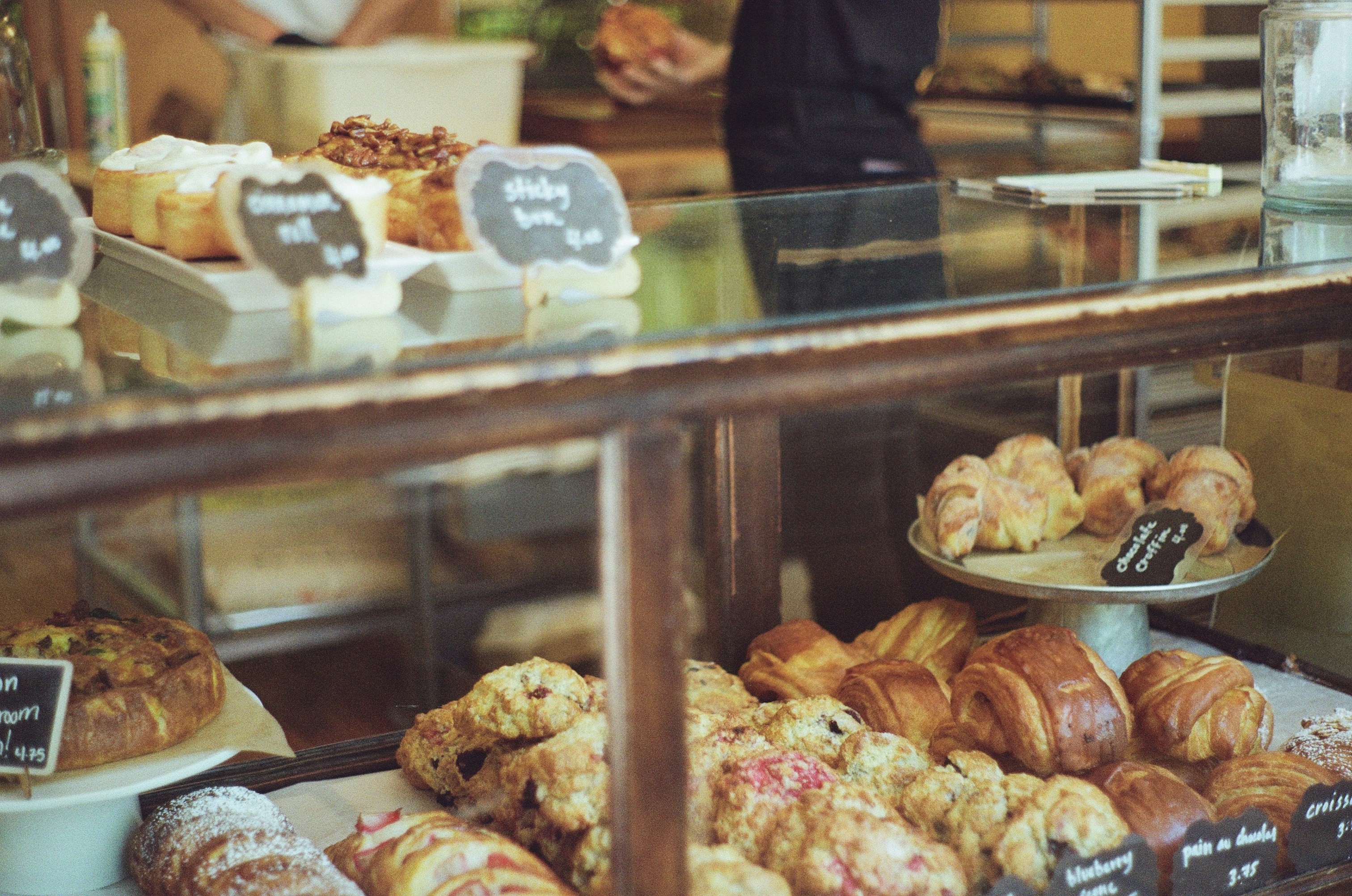 A bakery filled with lots of different types of pastries photo – Free ...