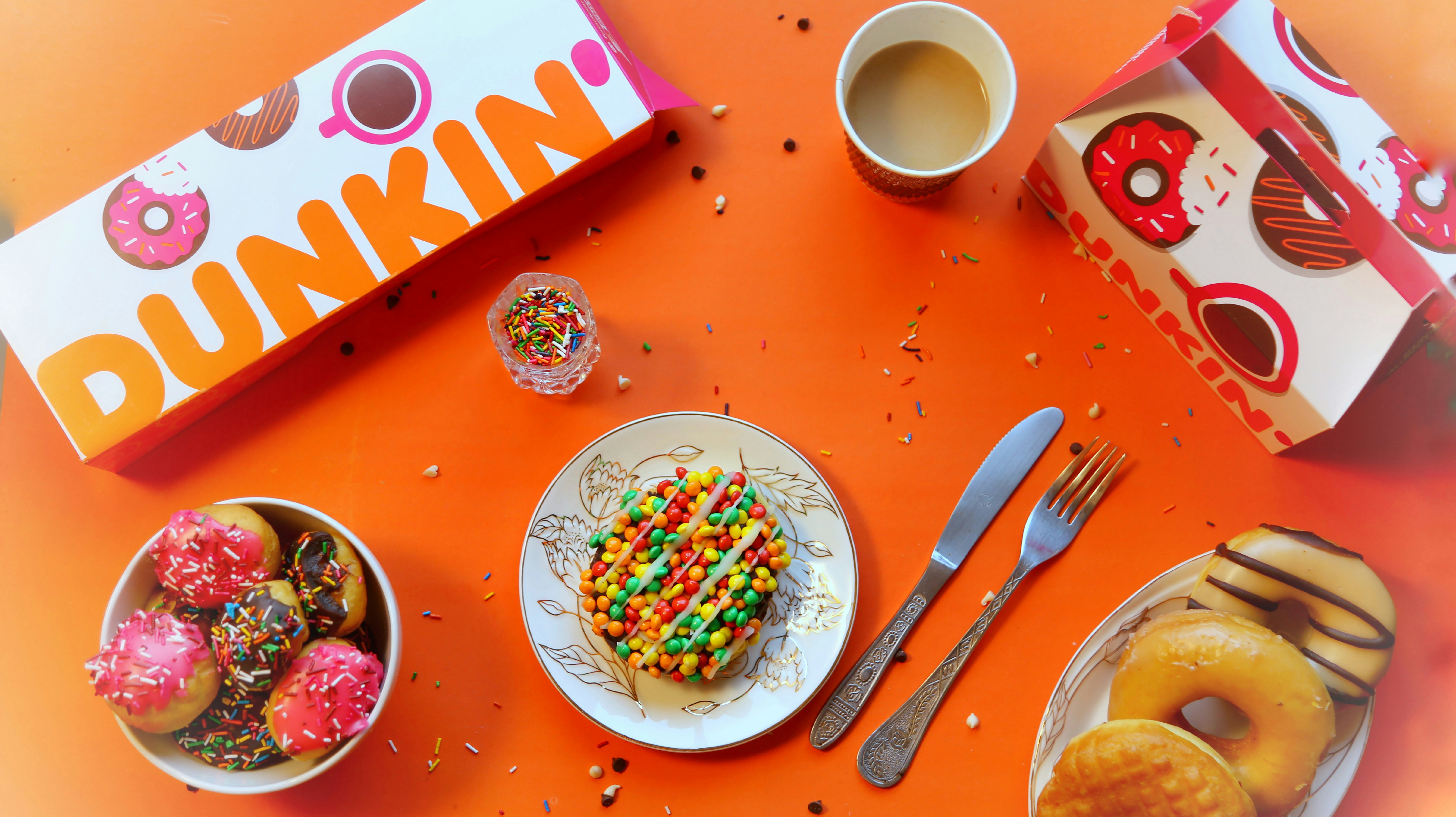 Colorful Donut Party on an Orange Table