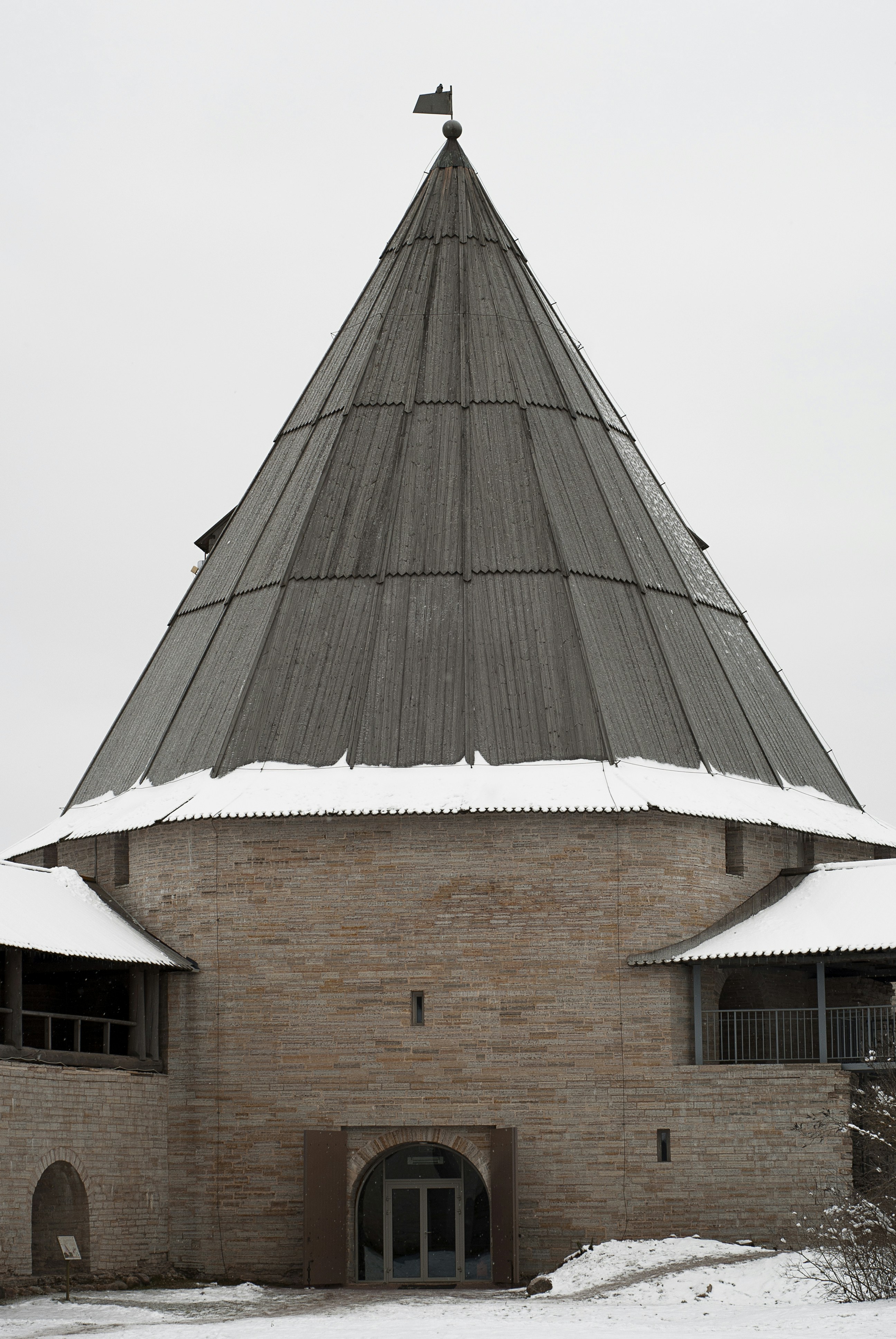 A building with a pointed roof in the snow photo – Free Russia Image on ...