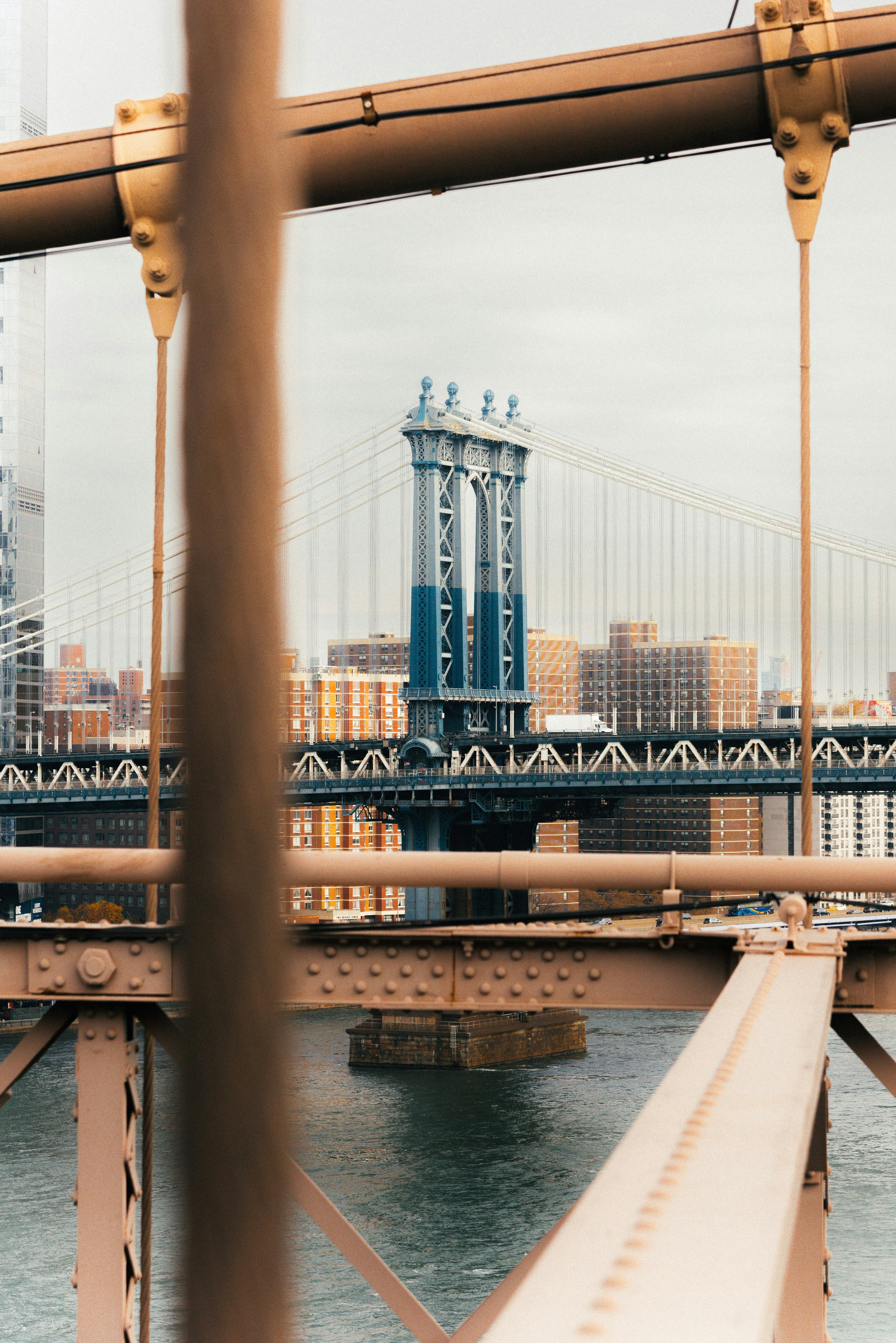 A view of a bridge over a body of water photo – Free Manhattan bridge ...