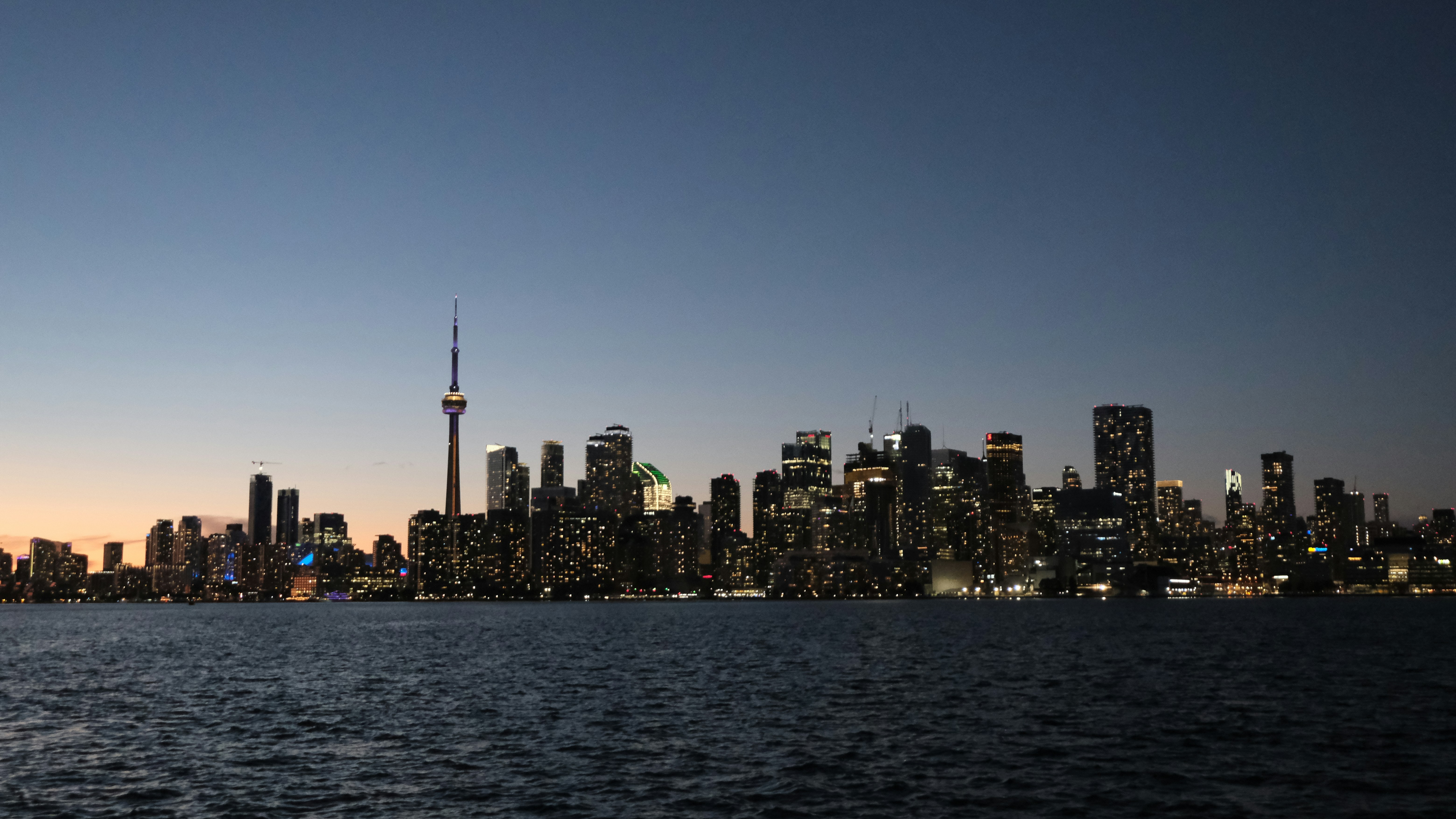 A view of a city skyline from the water photo – Free Toronto Image on ...