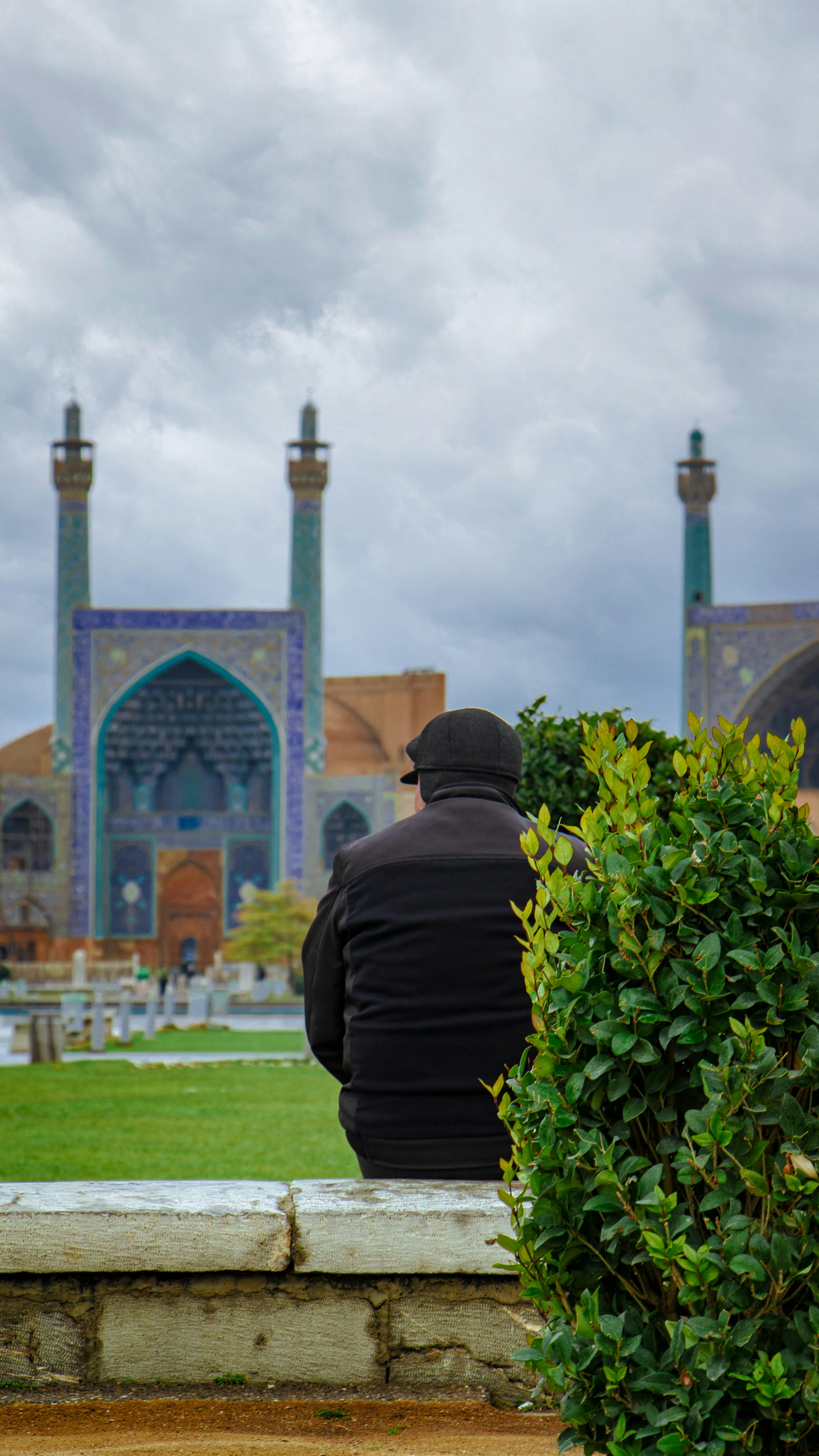 Solitary Observer Before a Sacred Facade