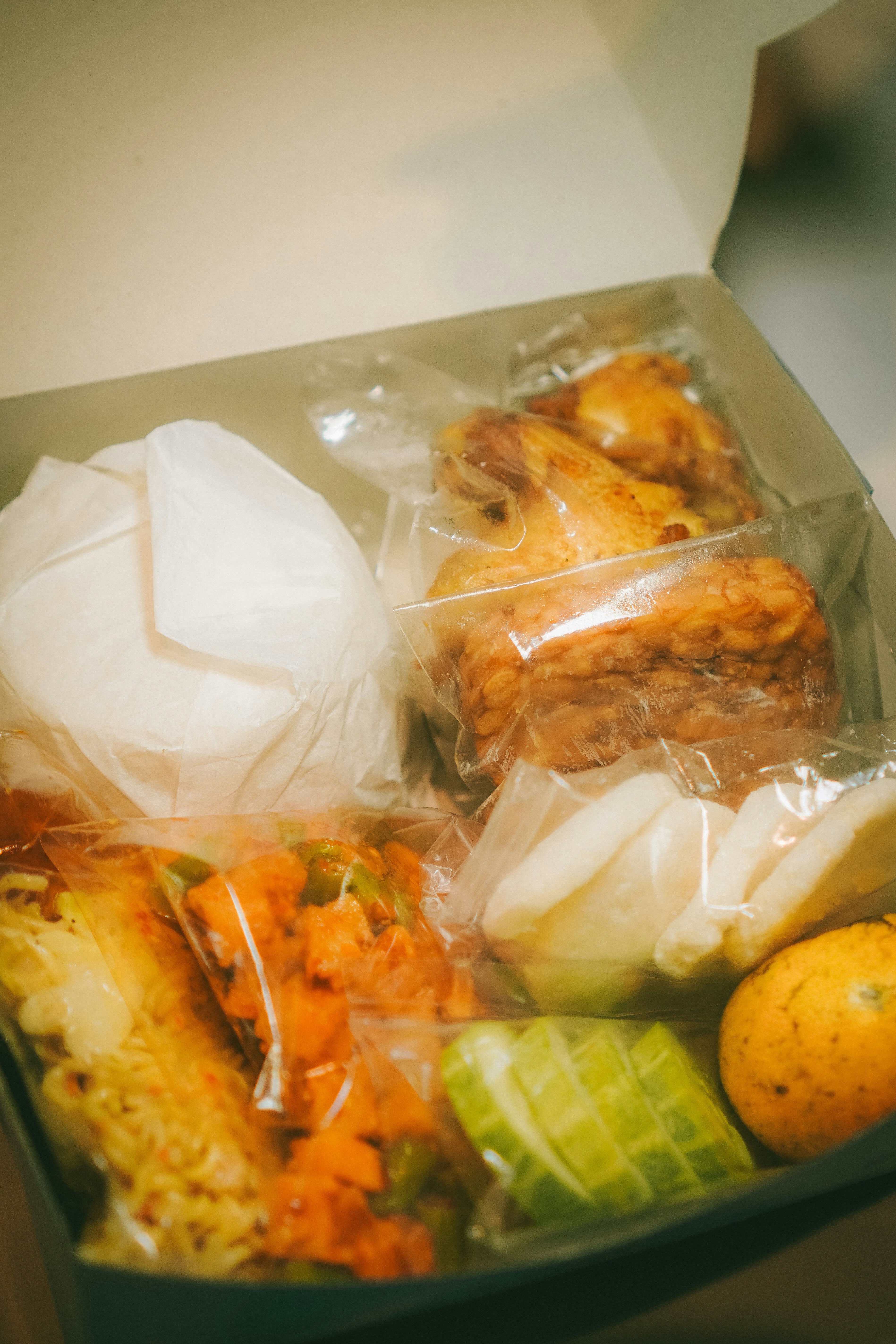 Cradled Crunch: Wrapped Pastries in a Takeout Box
