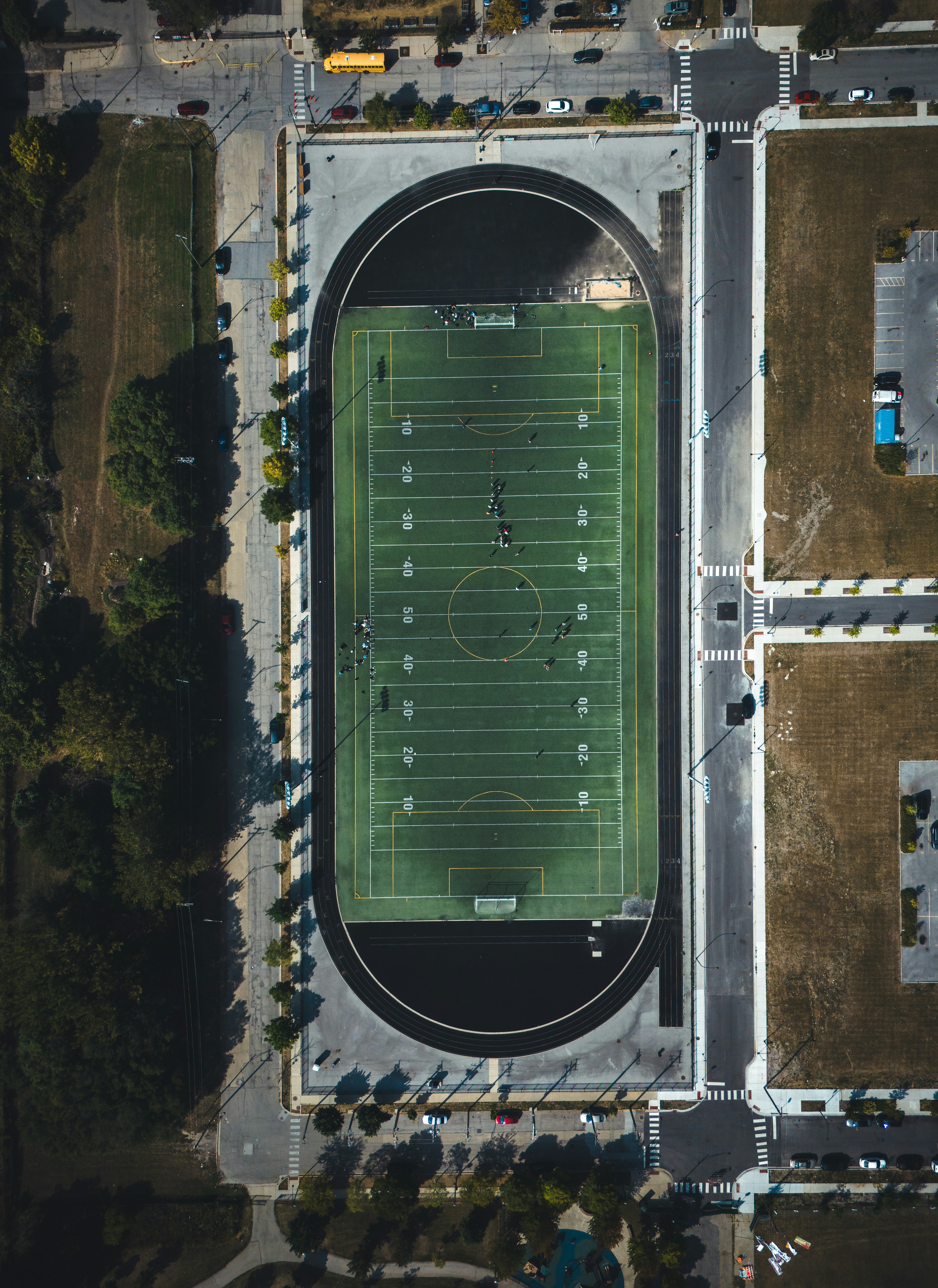 An aerial view of an empty football field photo – Free Chicago Image on ...